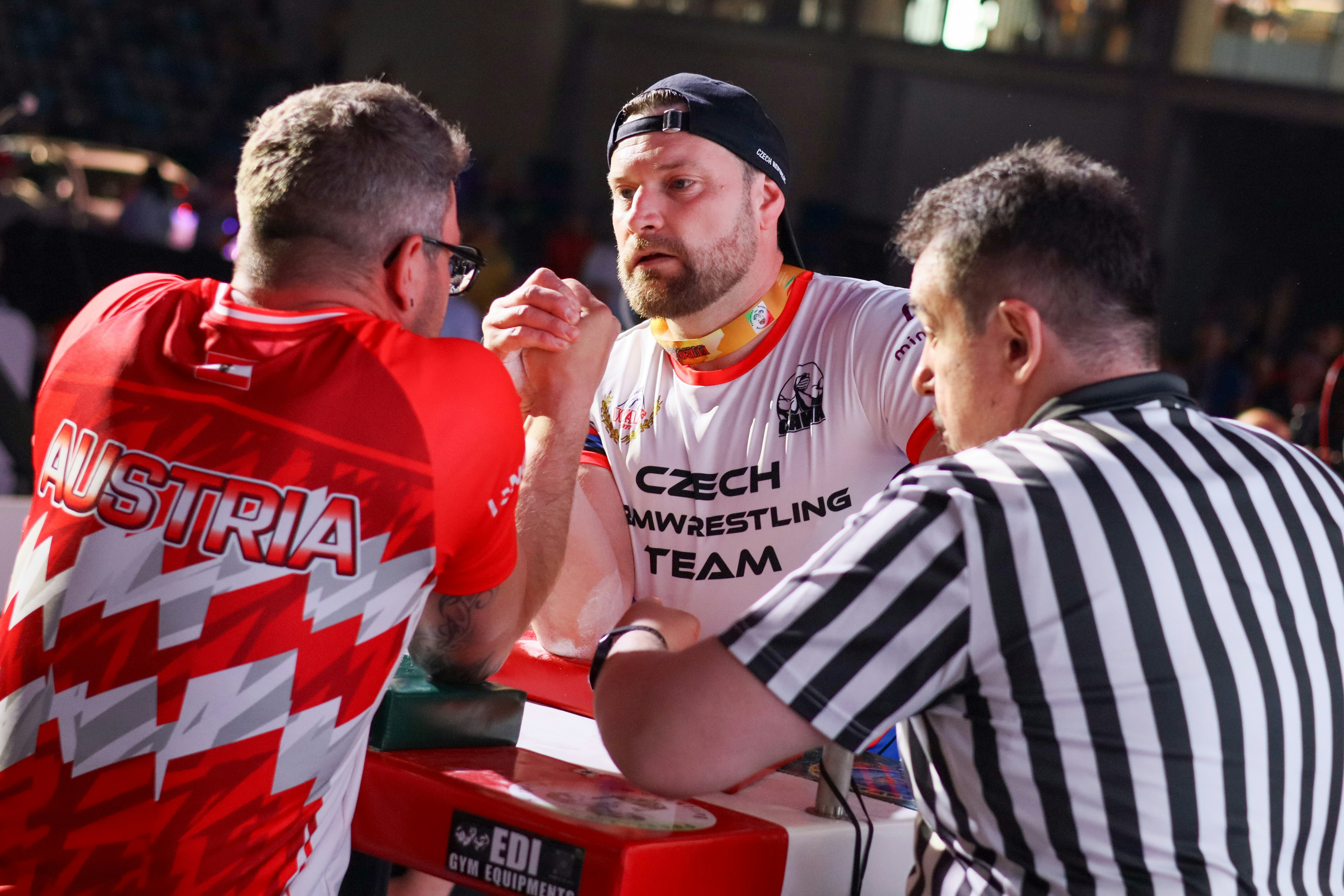 Arm Wrestling Showdown: Polish Team Faces Austria Across the Table