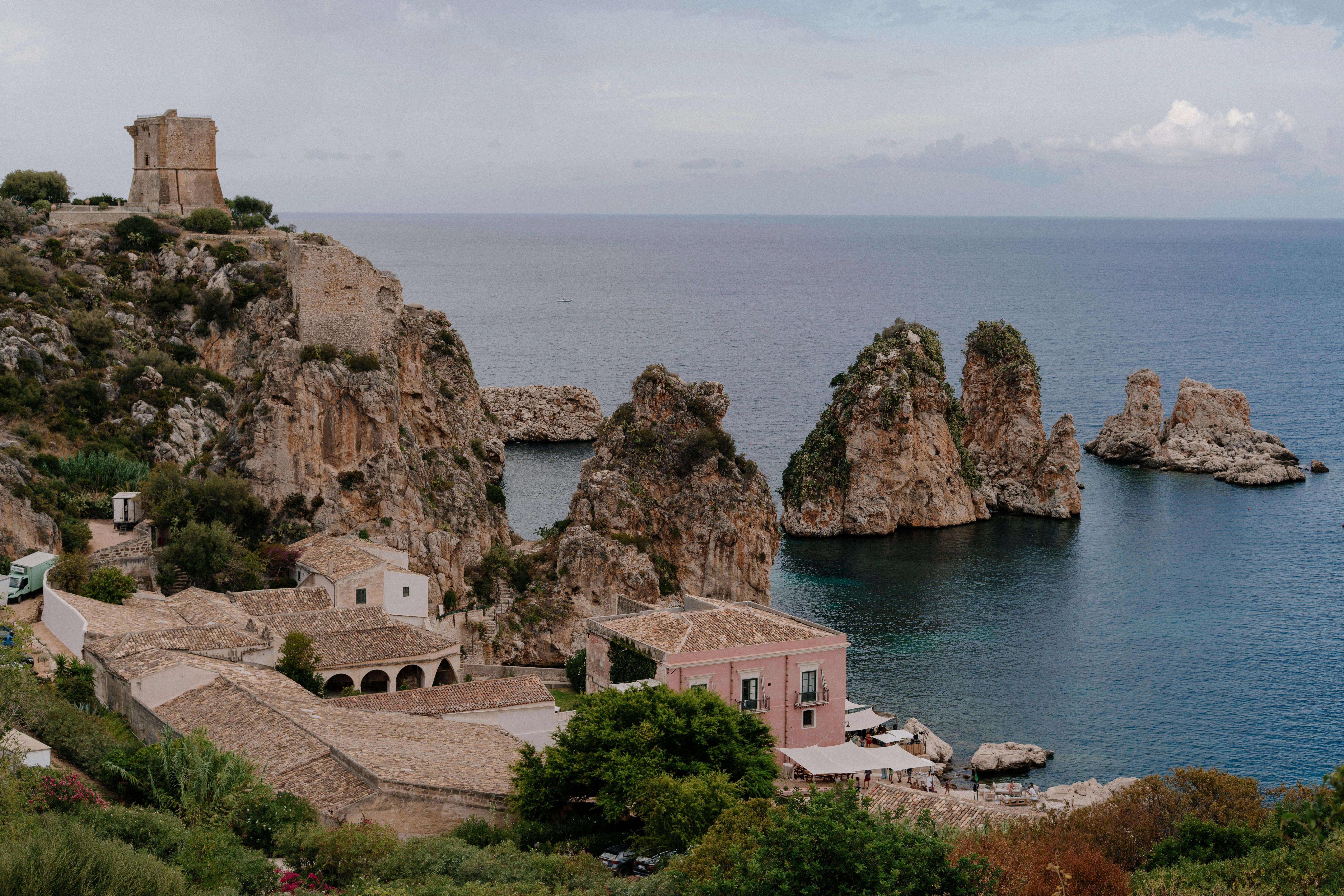 Clifftop Village Overlooking a Sea Arch