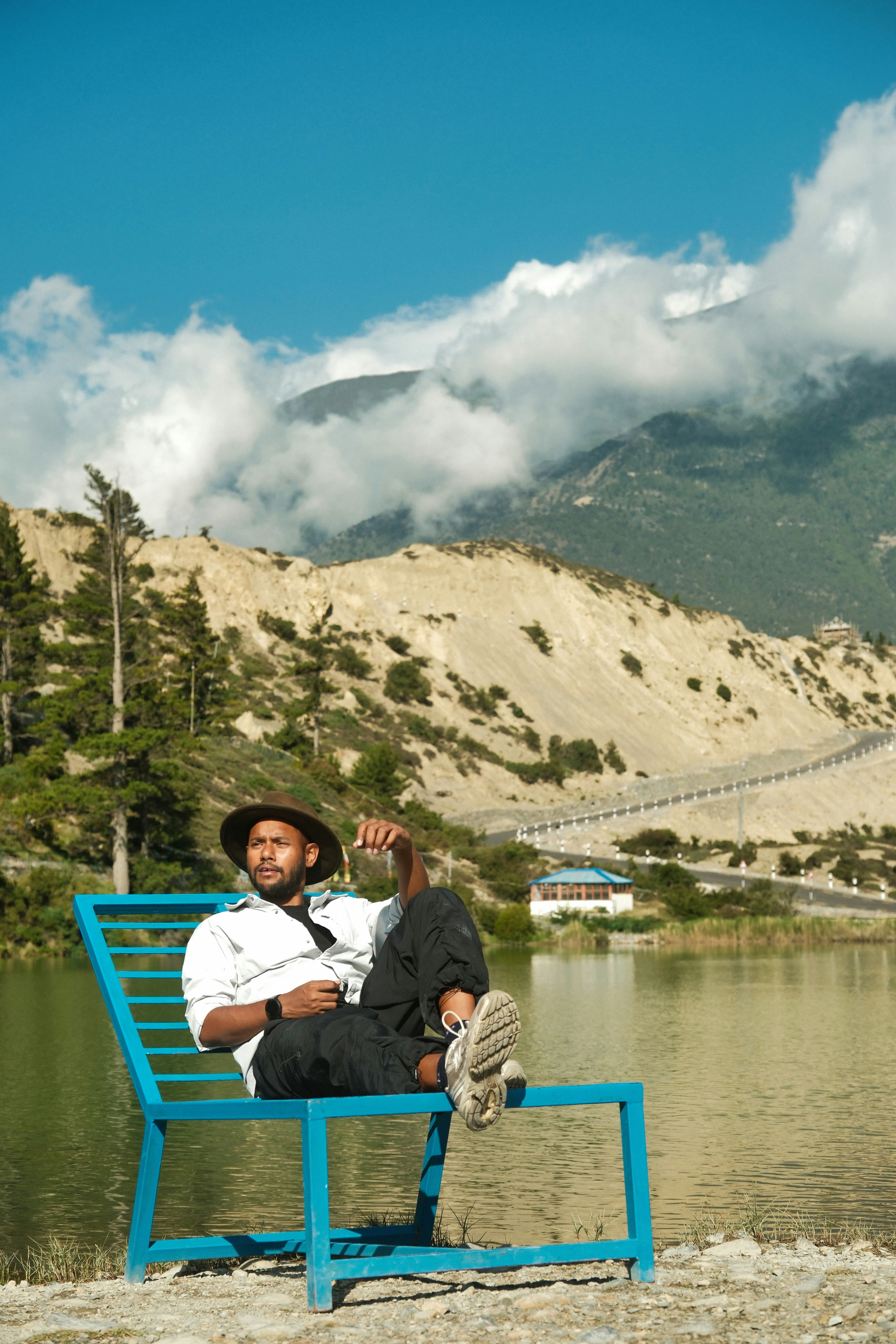 Blue Bench and Horizons: A Quiet Moment by the Mountain Lake
