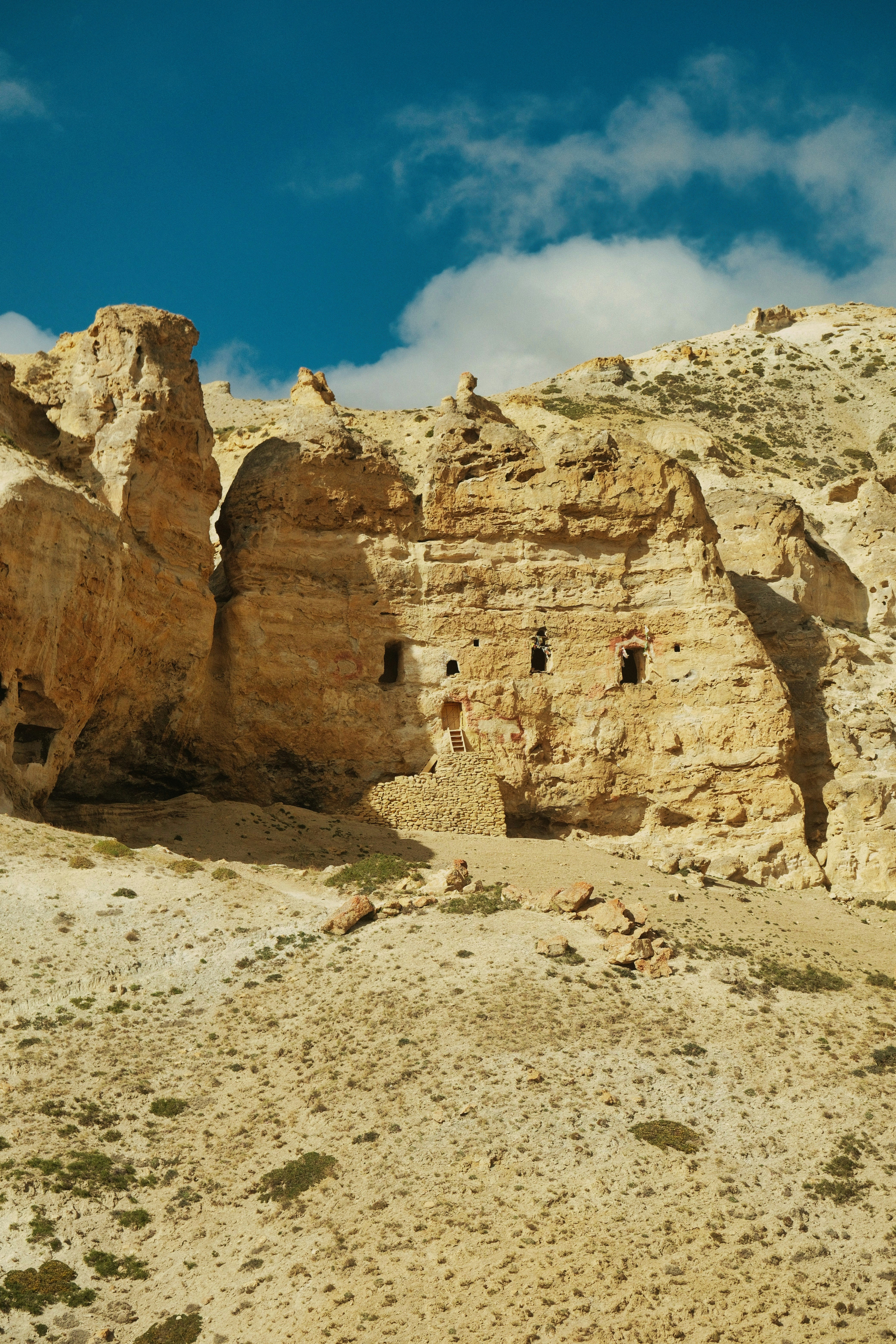 Hidden Staircase in Sunlit Cliff