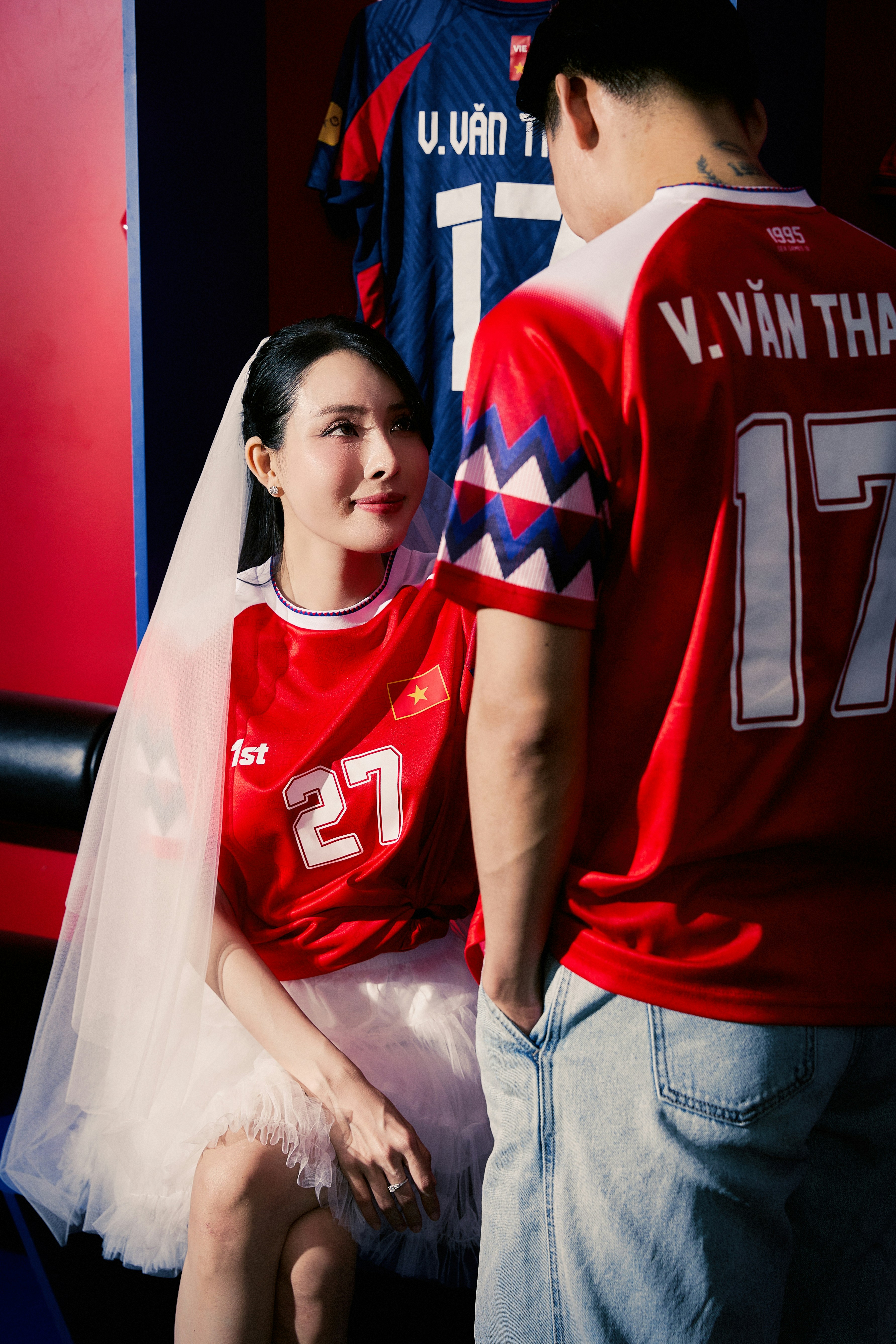 Bride in Red: Quiet Moment Between Two Teammates Before the Game