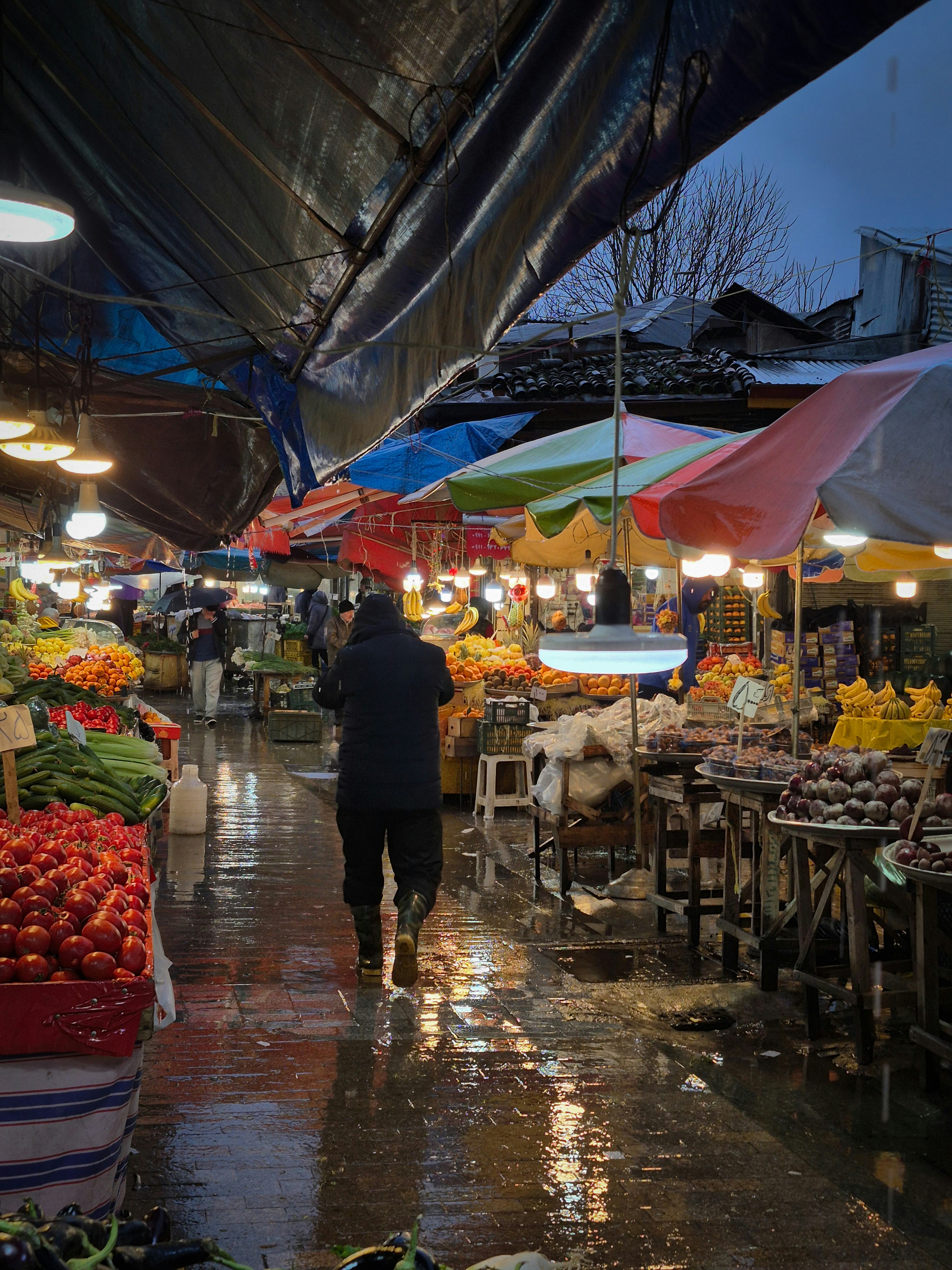 Night Market Walk: A Runner Beneath Colorful Canopies