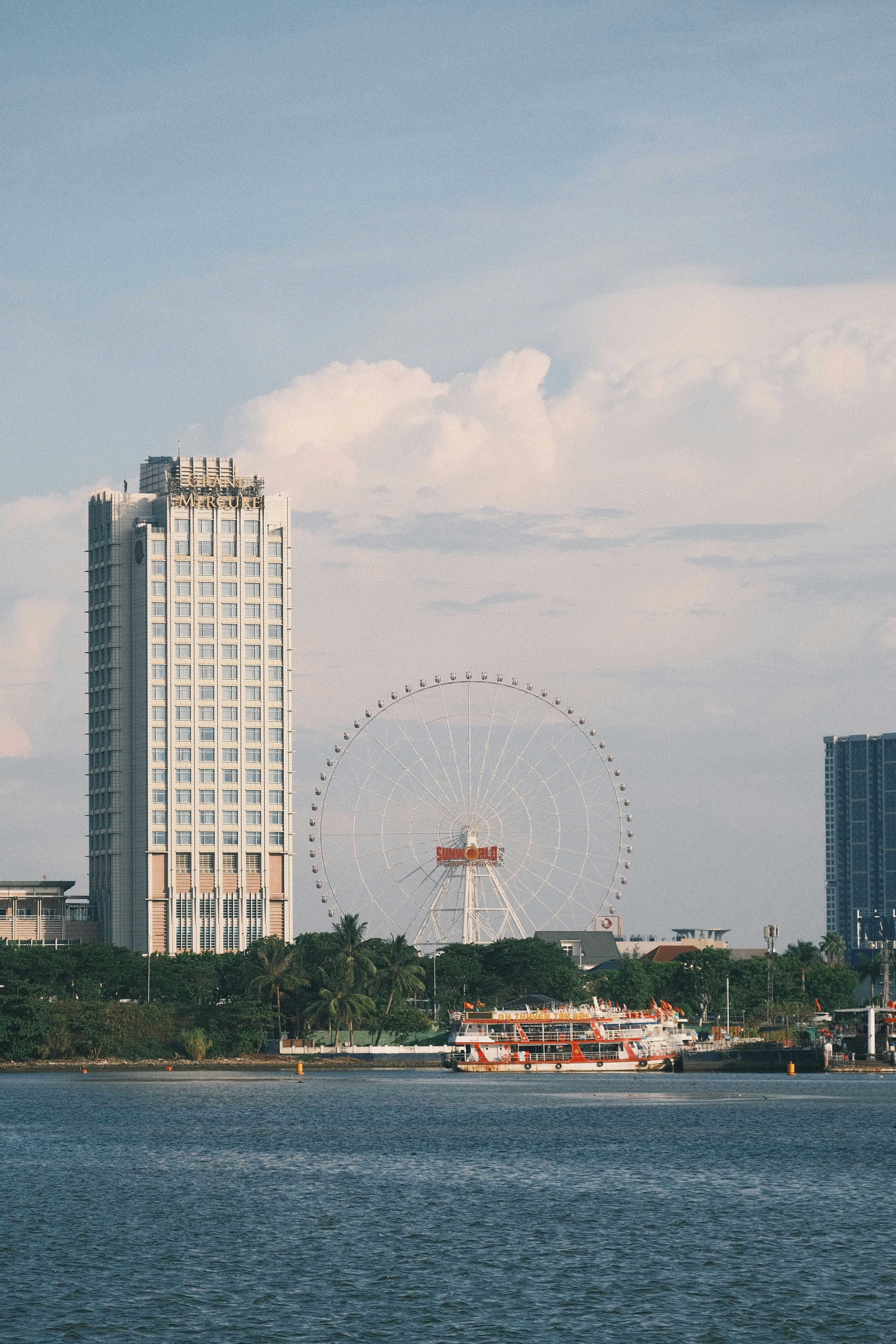 City Horizon: Ferris Wheel Over the Waterfront