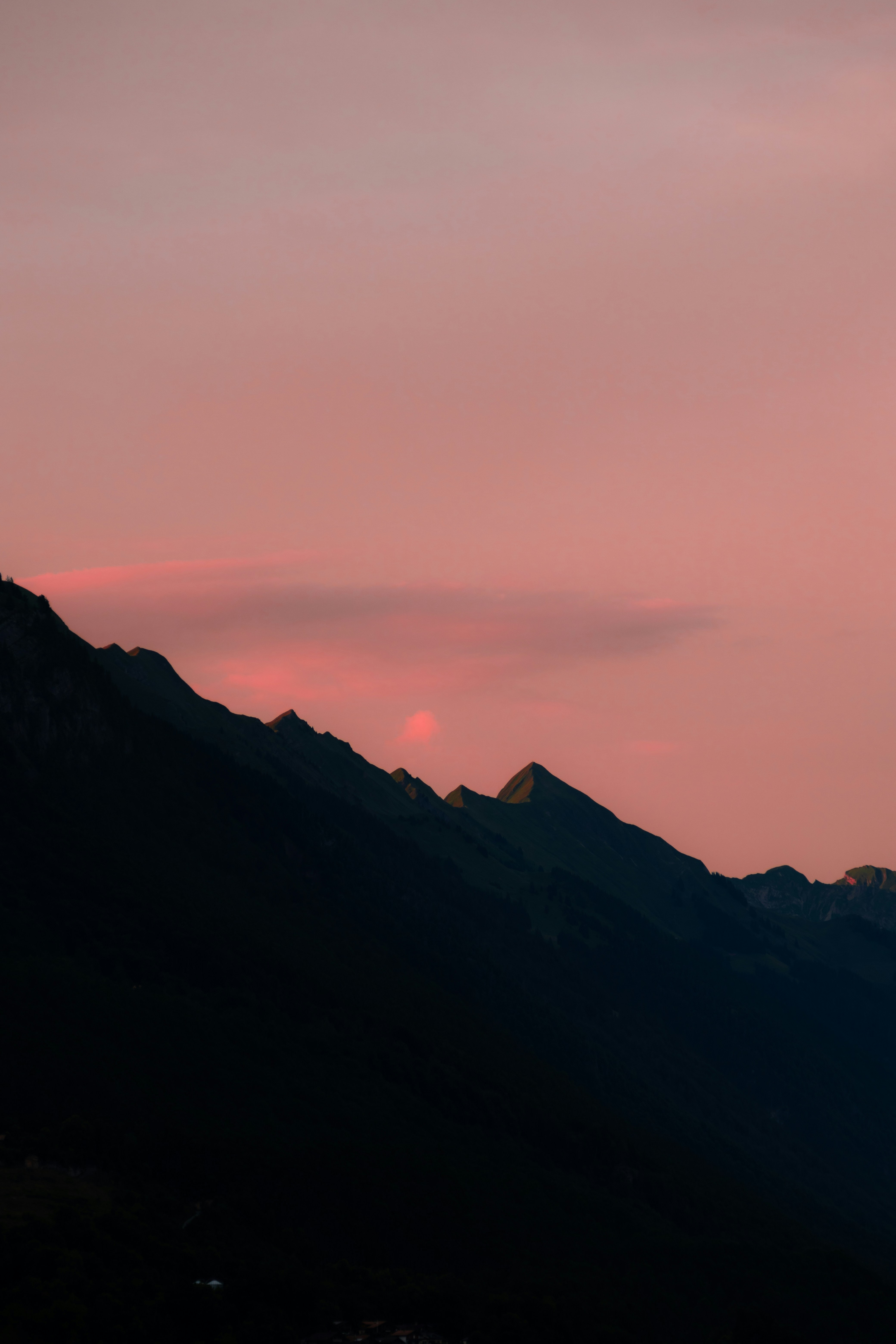Pink Twilight Over Jagged Peaks