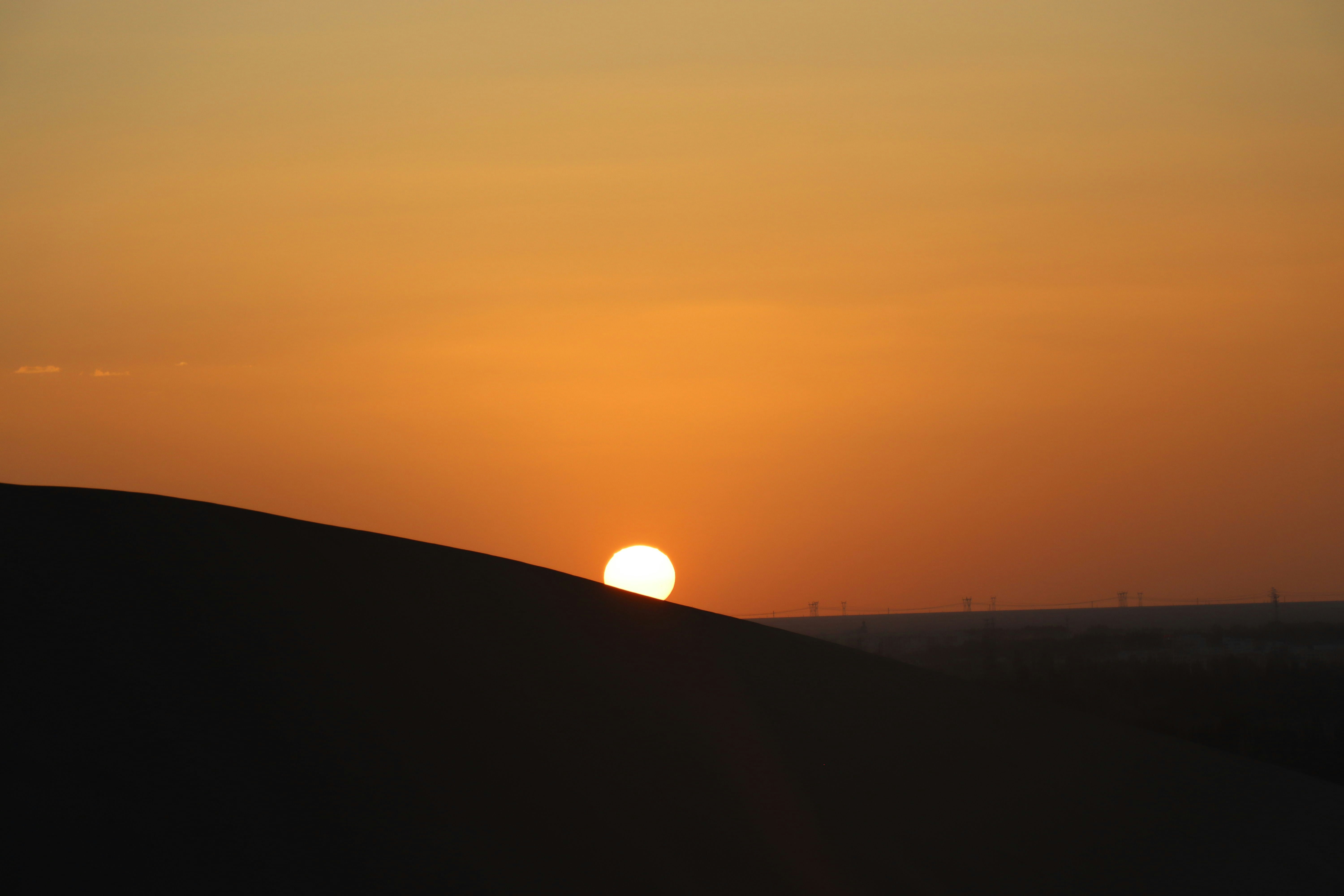 Sunset Crest on Quiet Dune Horizon