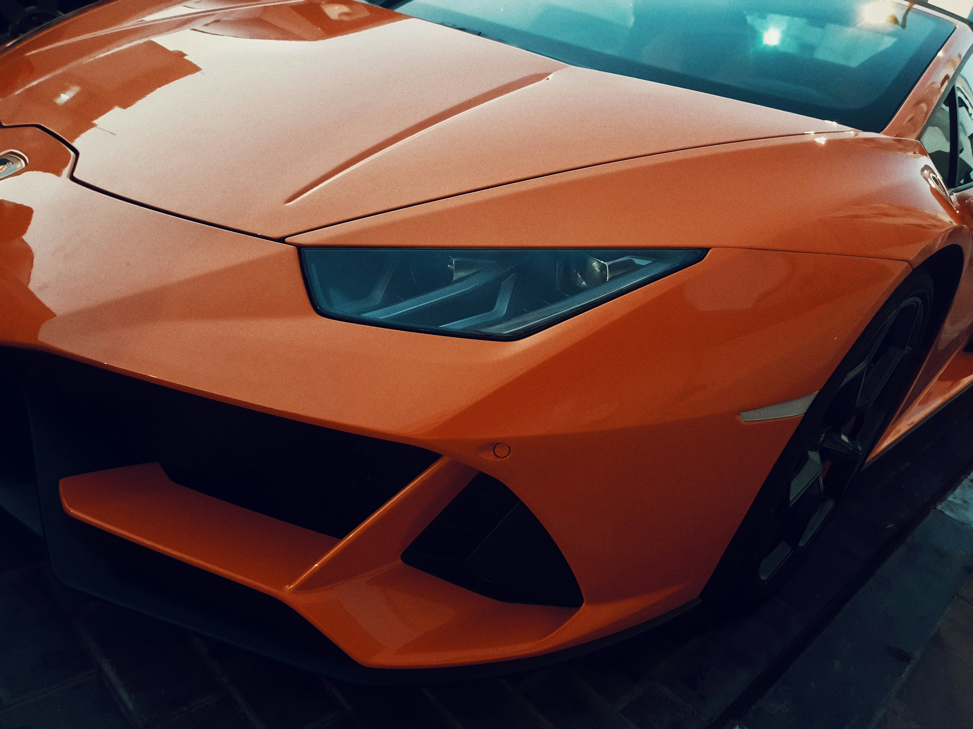 Orange Velocity: Front-Quarter of a Lamborghini-like Sports Car