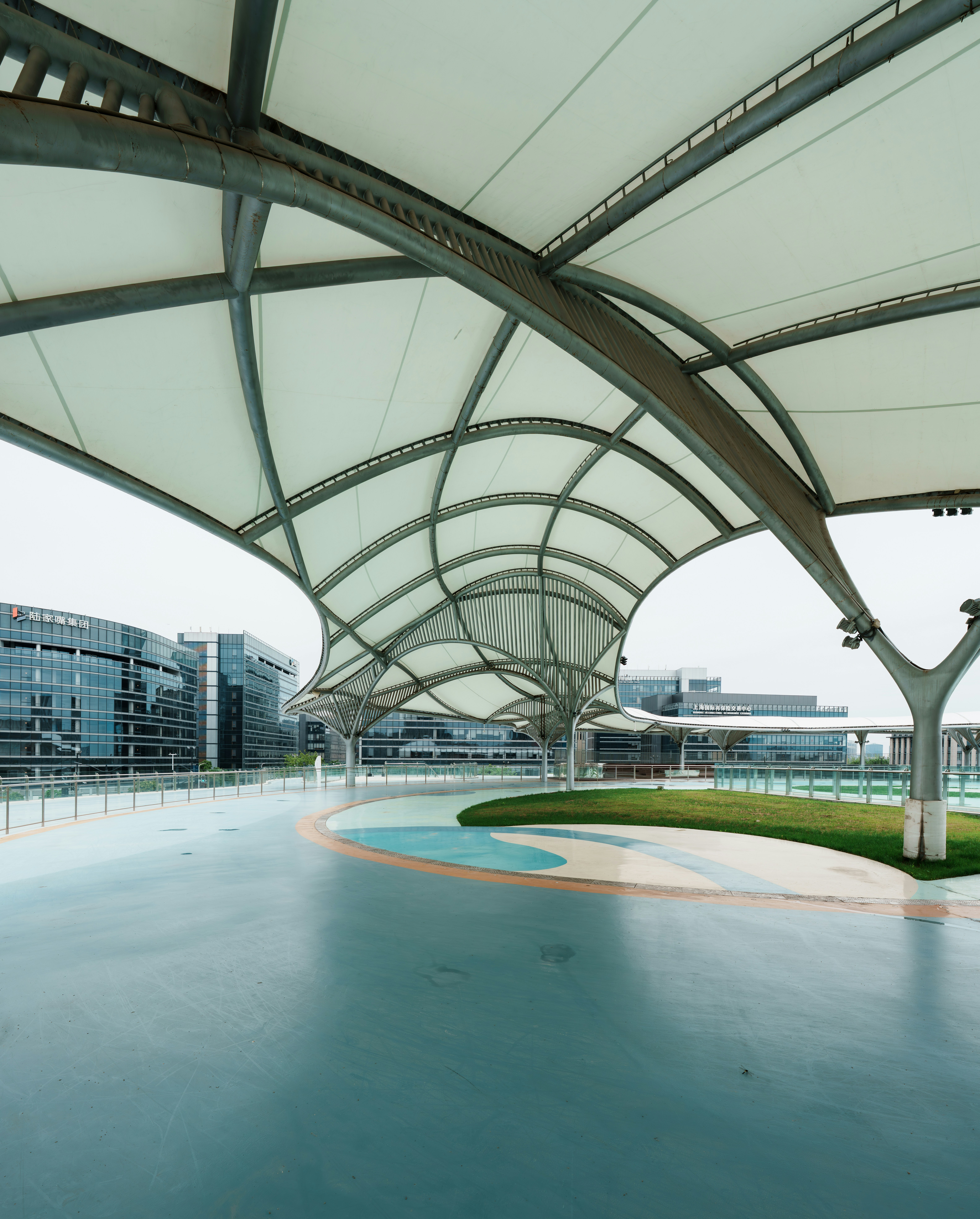 Curved Canopy Cathedral Over Waterfront Promenade