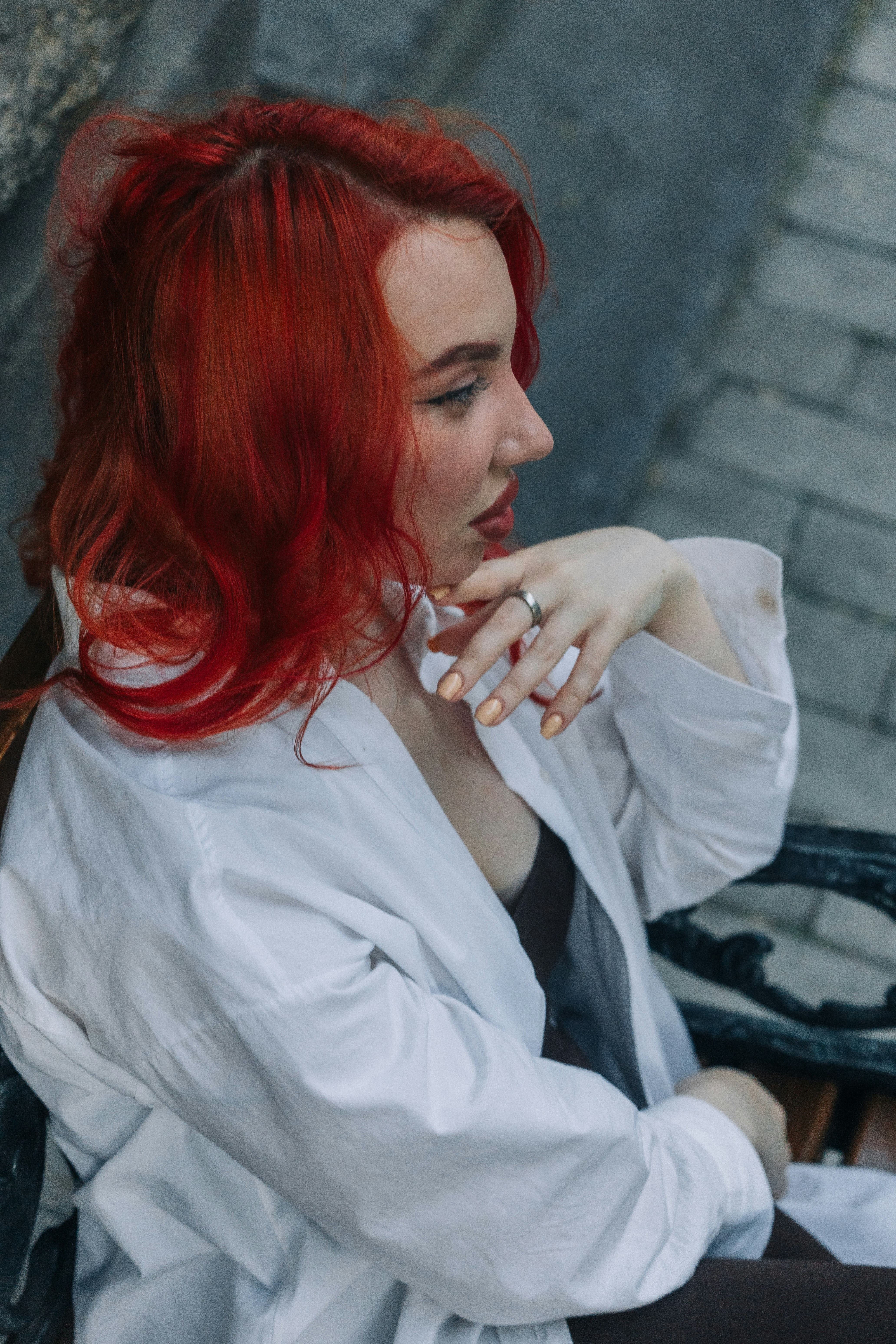 Crimson Goddess in Soft Light on a Park Bench