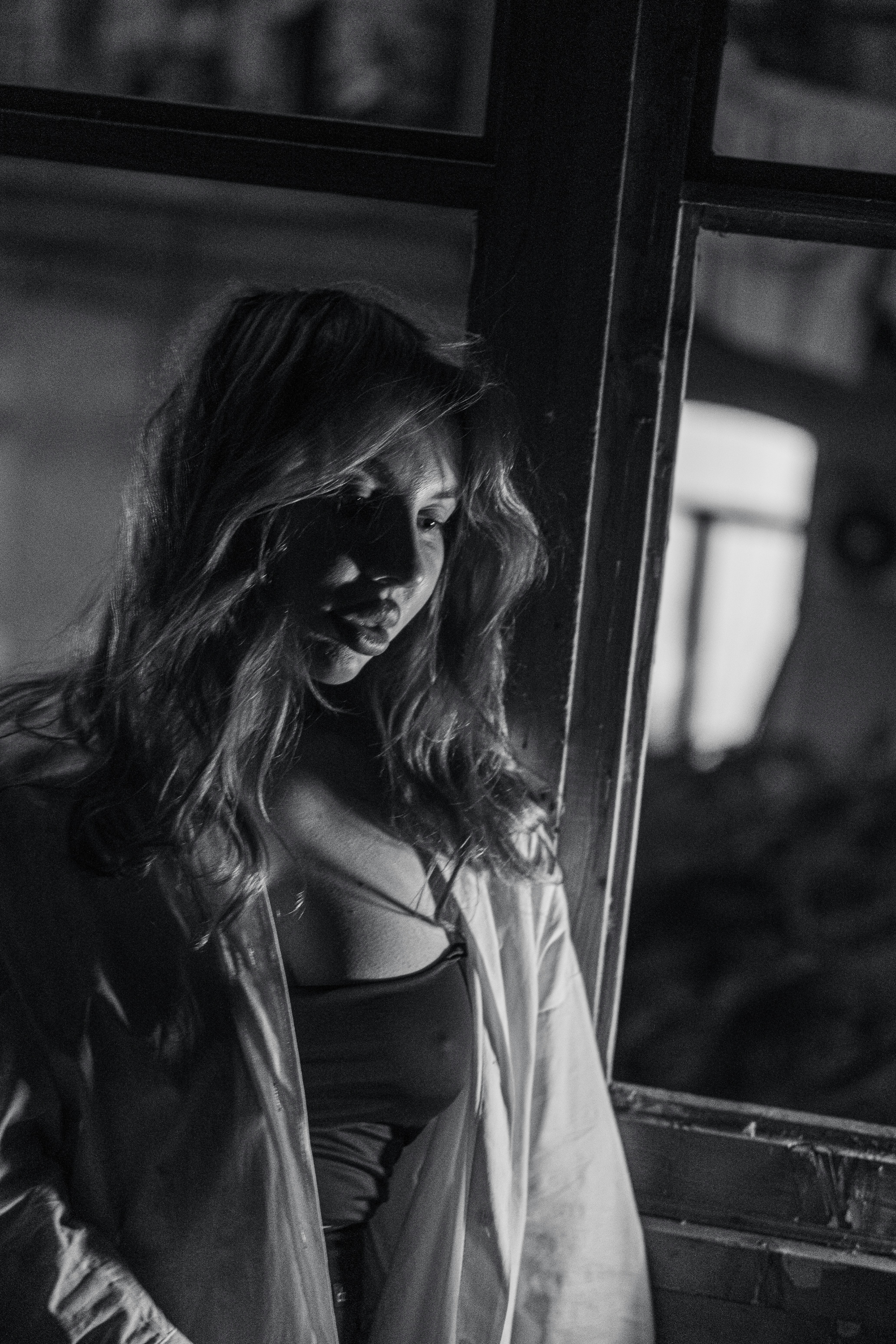 Midnight Window: A Quiet Portrait in Black and White