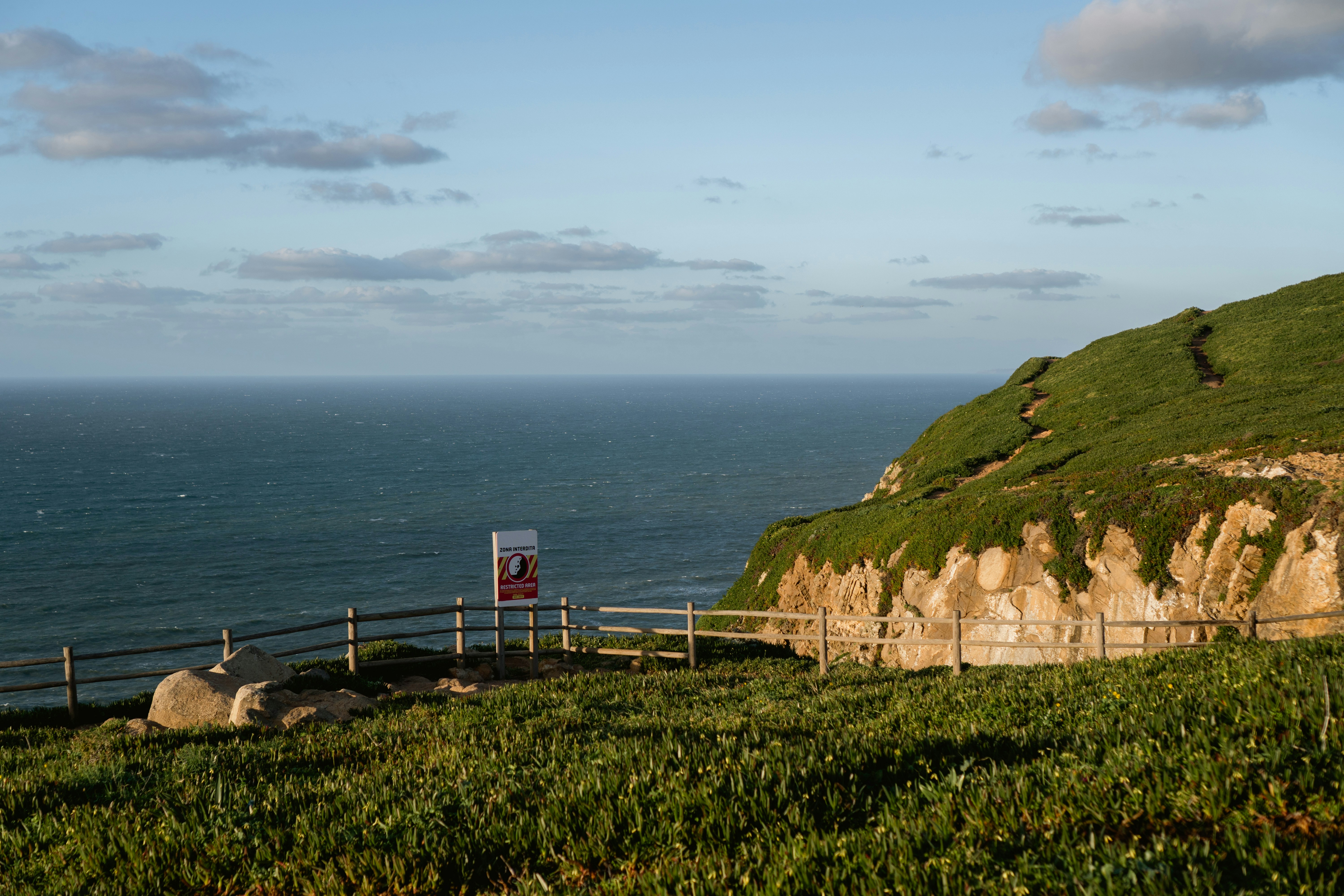 Cliffside Trail at Golden Hour Overlooking the Sea