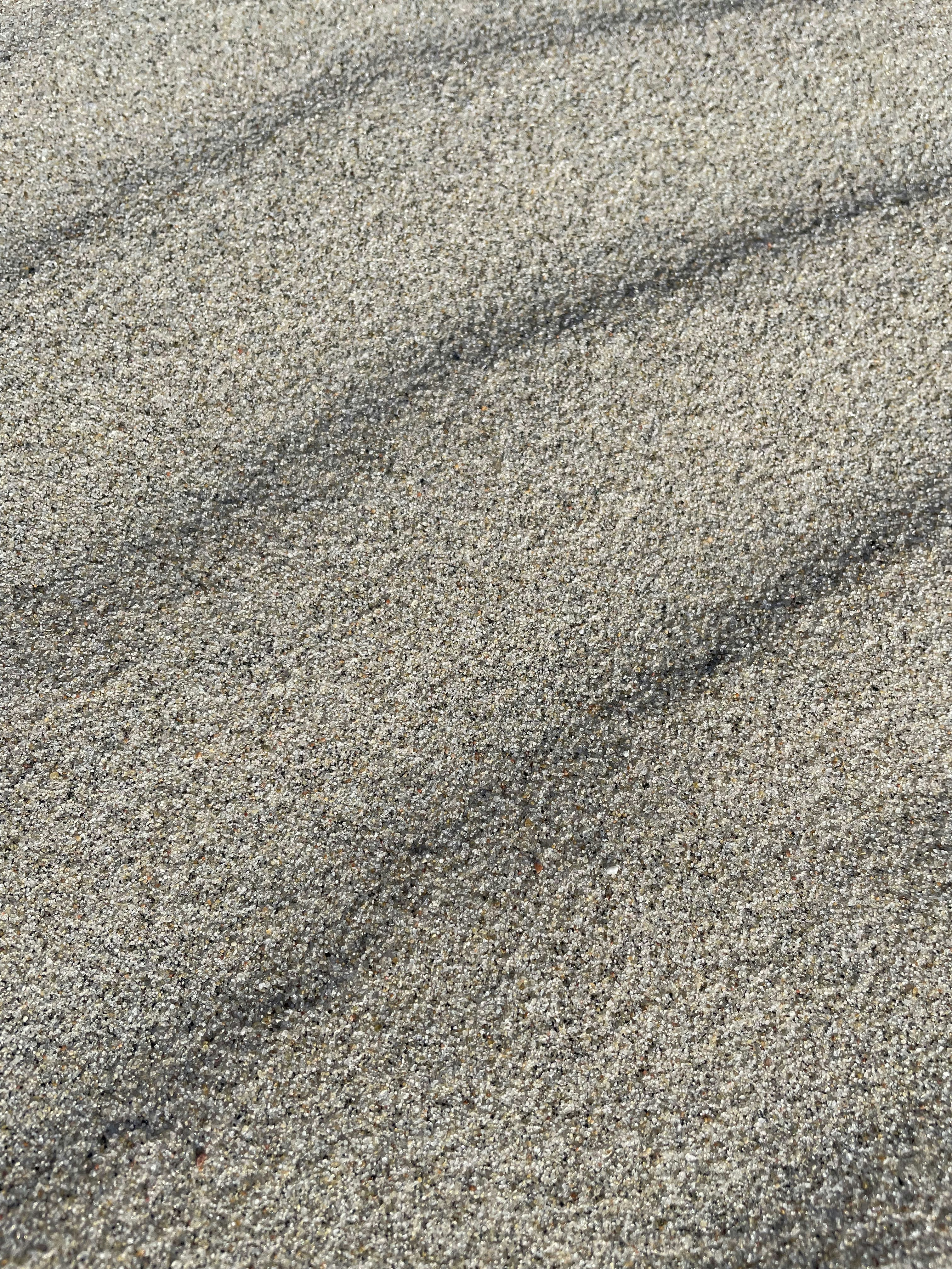 Whispers in the Sand: Subtle Ridges on a Quiet Beach