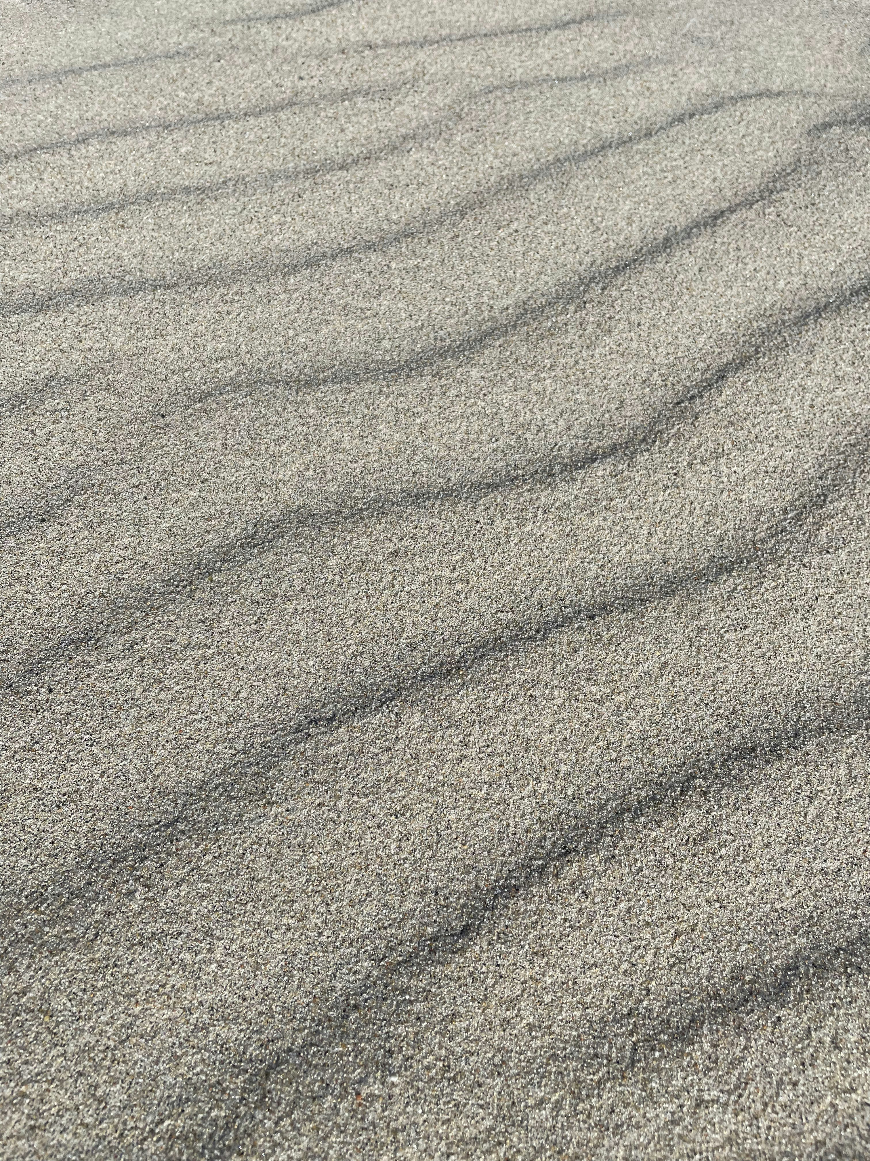 Waves of Sand: Subtle Ripples in Desert Light