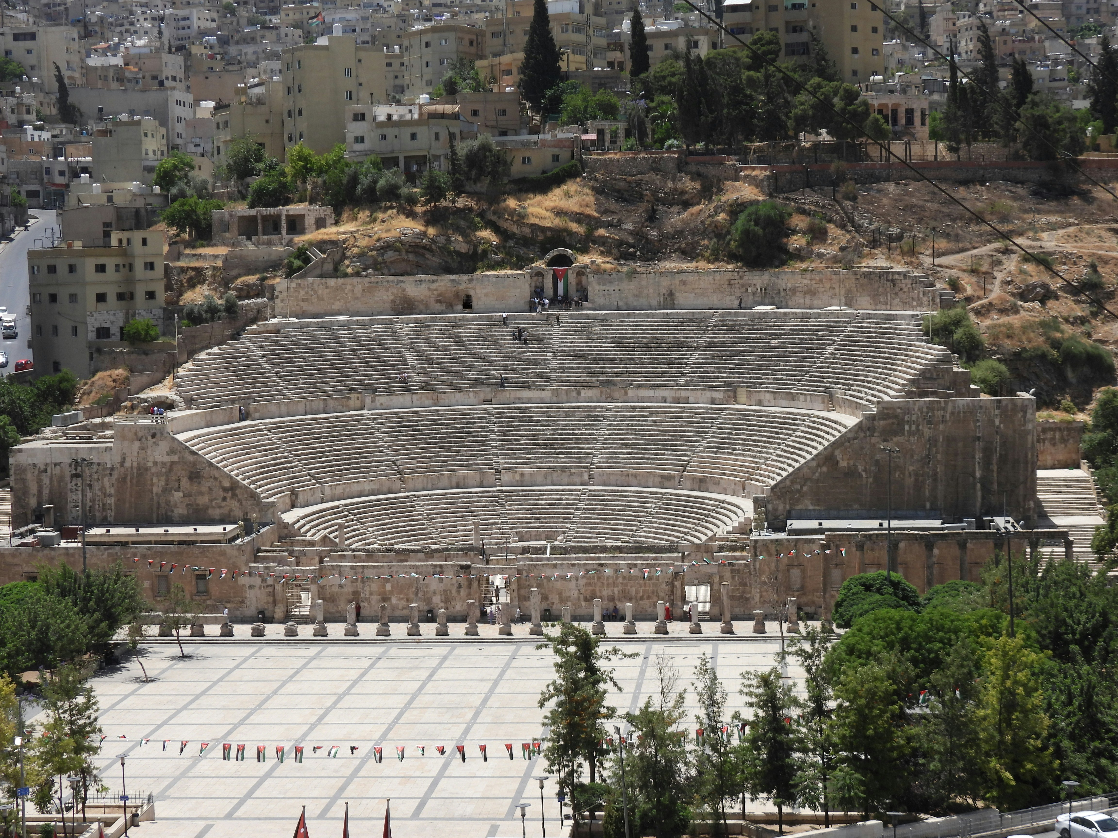 Ancient Roman Theater Terrace Framed by City Hillside