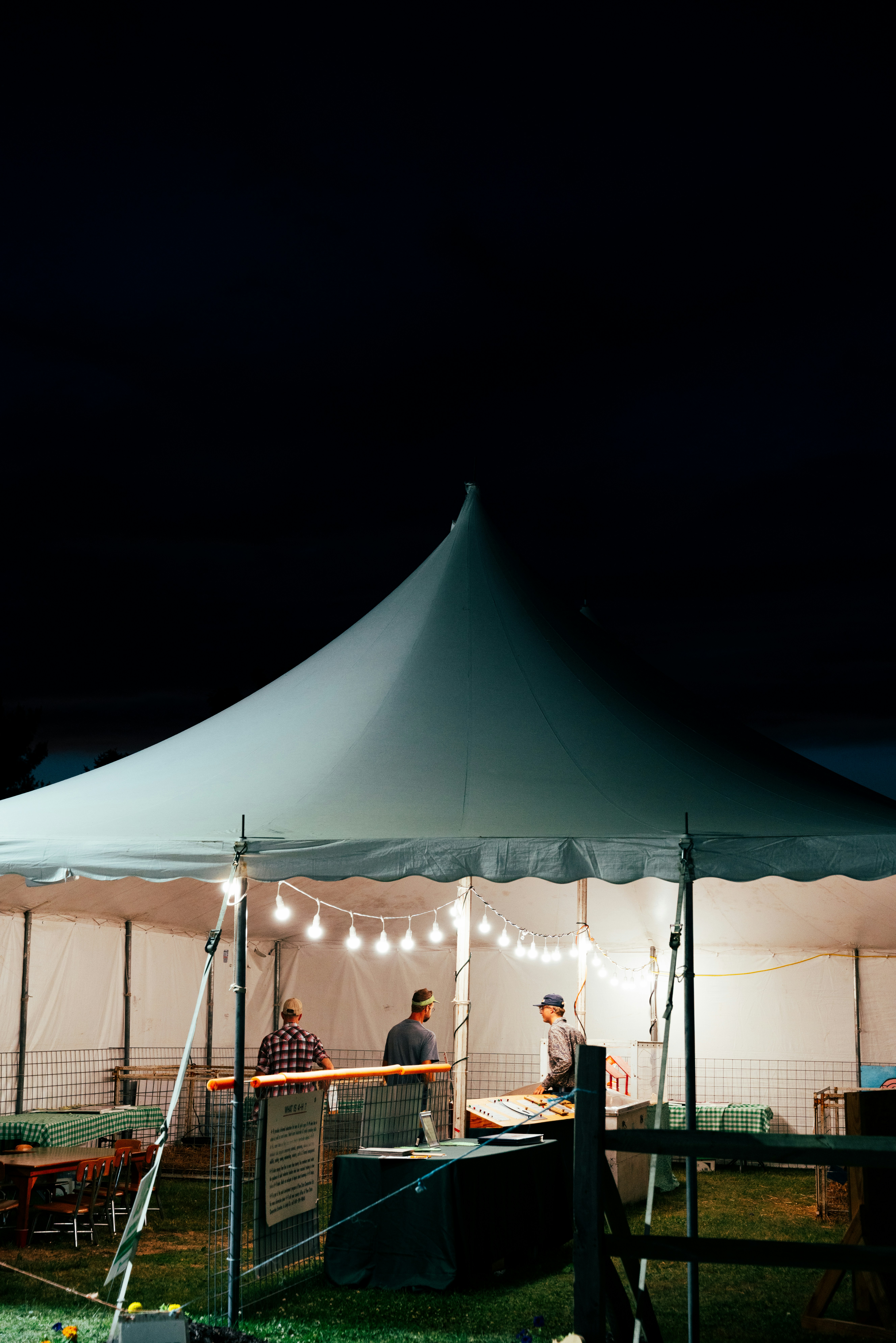 Moonlit Market Tent: Warm Lights under a Night Sky