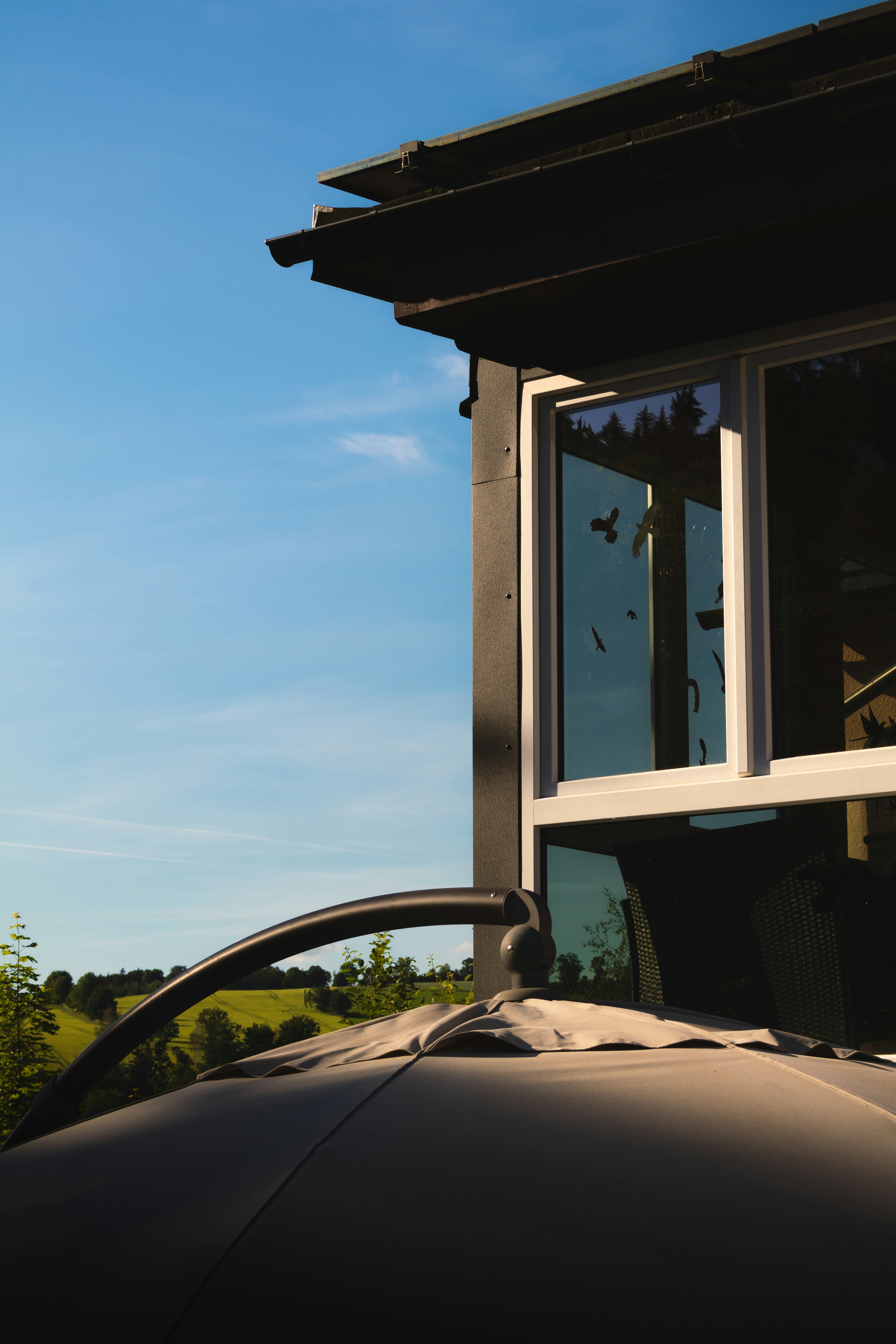 Vehicle-Window Vista: A Quiet Corner of a Modern Building