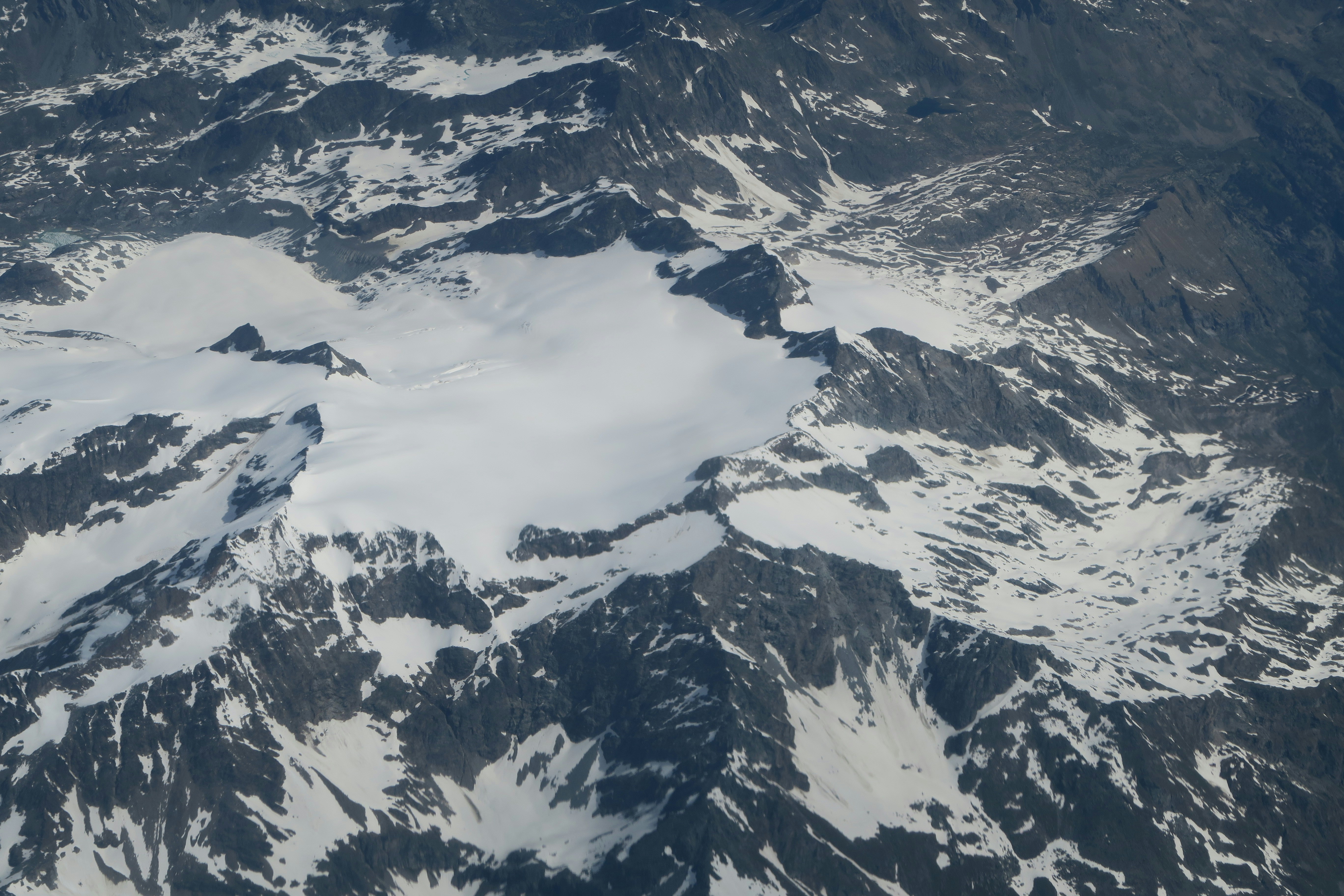 Glacial Crater Crown: Aerial Icefield at the Snowbound Rim