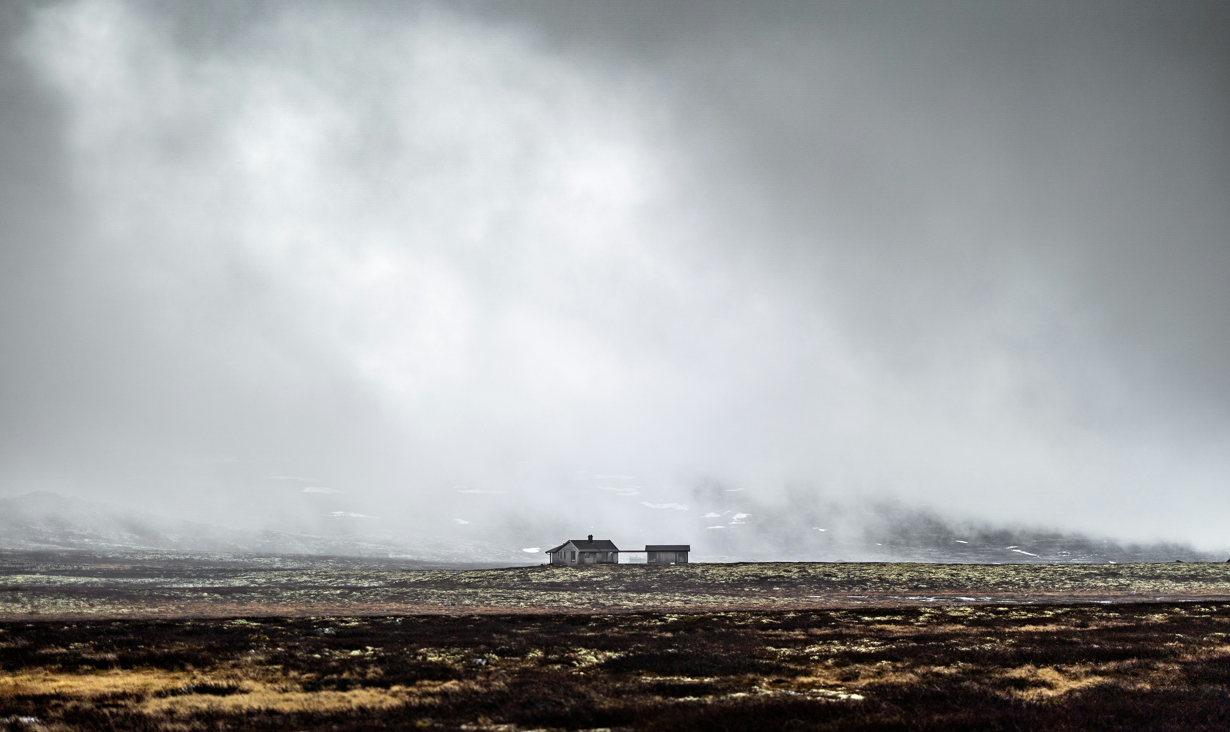 Lonely Outpost Rising Above Mist