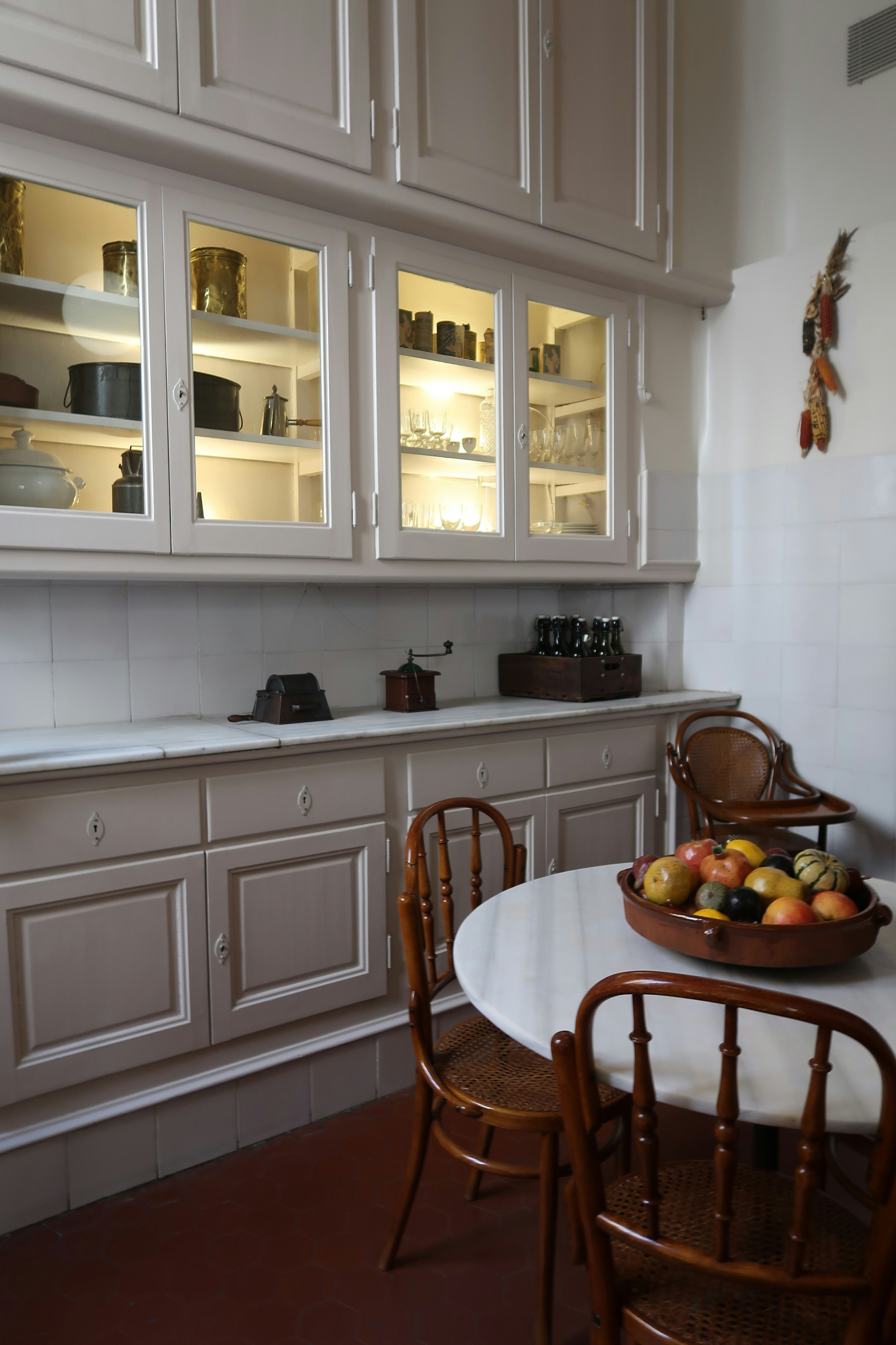 Sunlit Kitchen Still Life with Cupboard Glass Doors