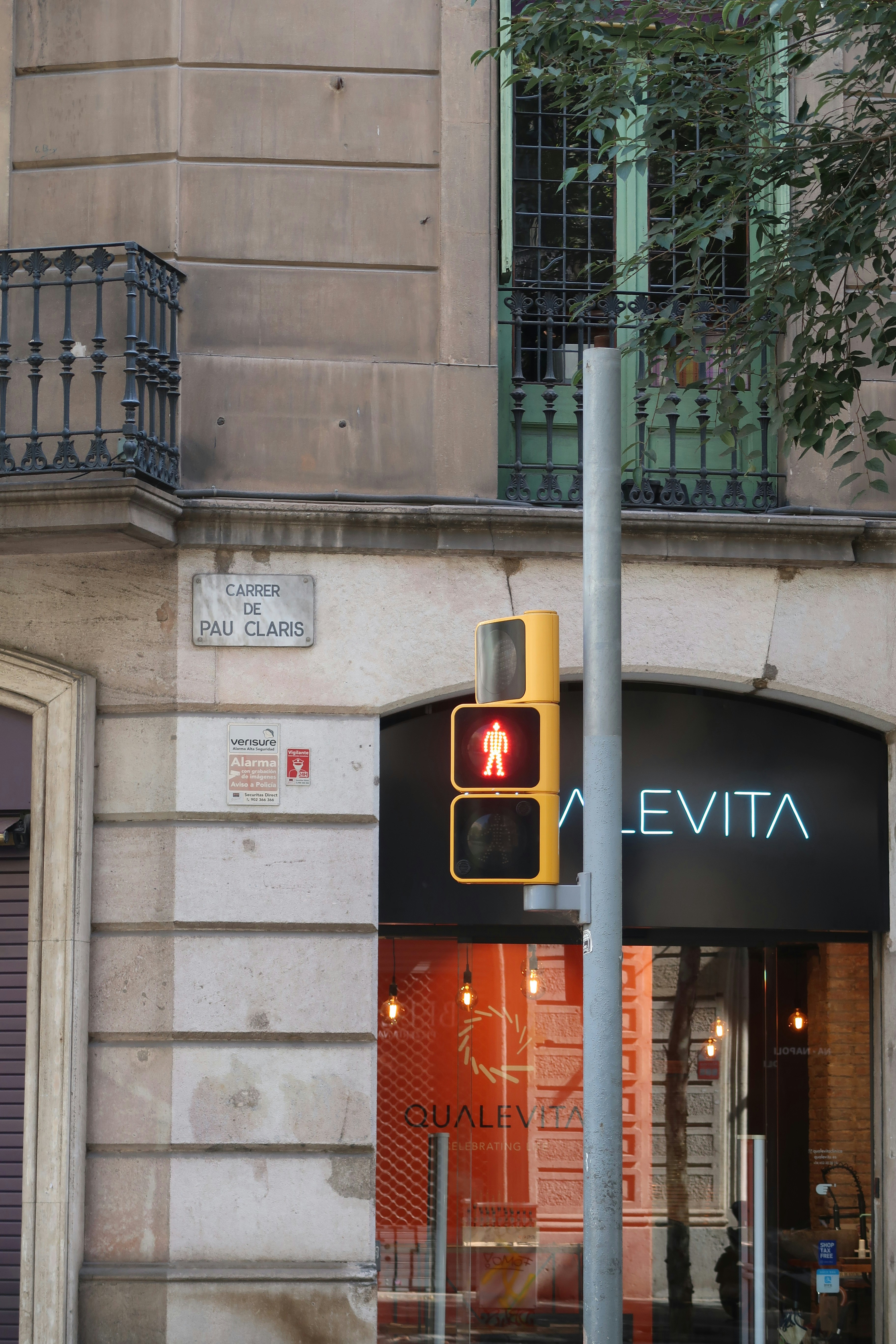 Crosswalk Signal Clipped by City Facade