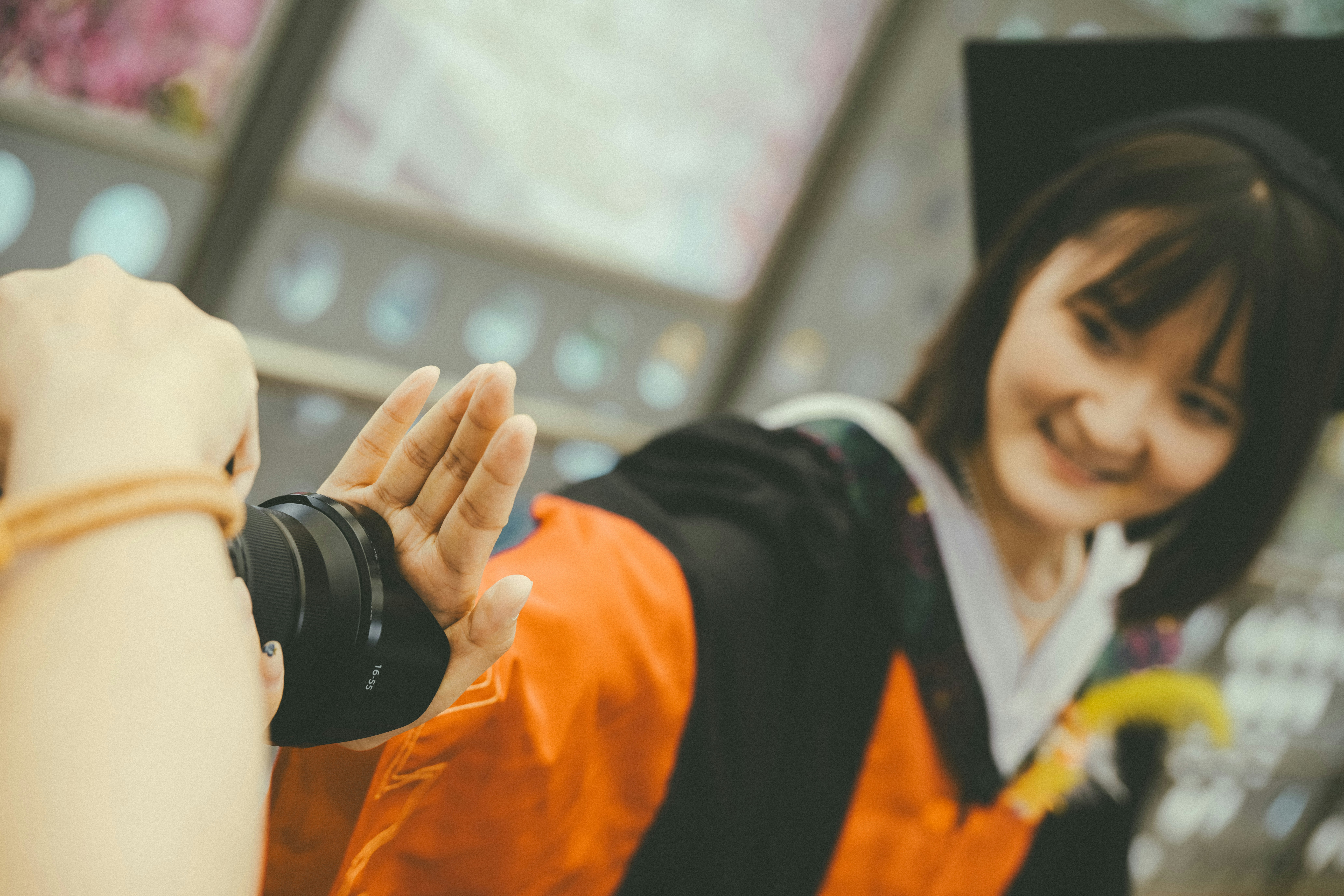 Handshake in Focus: A Graduation Moment in Mid-Action