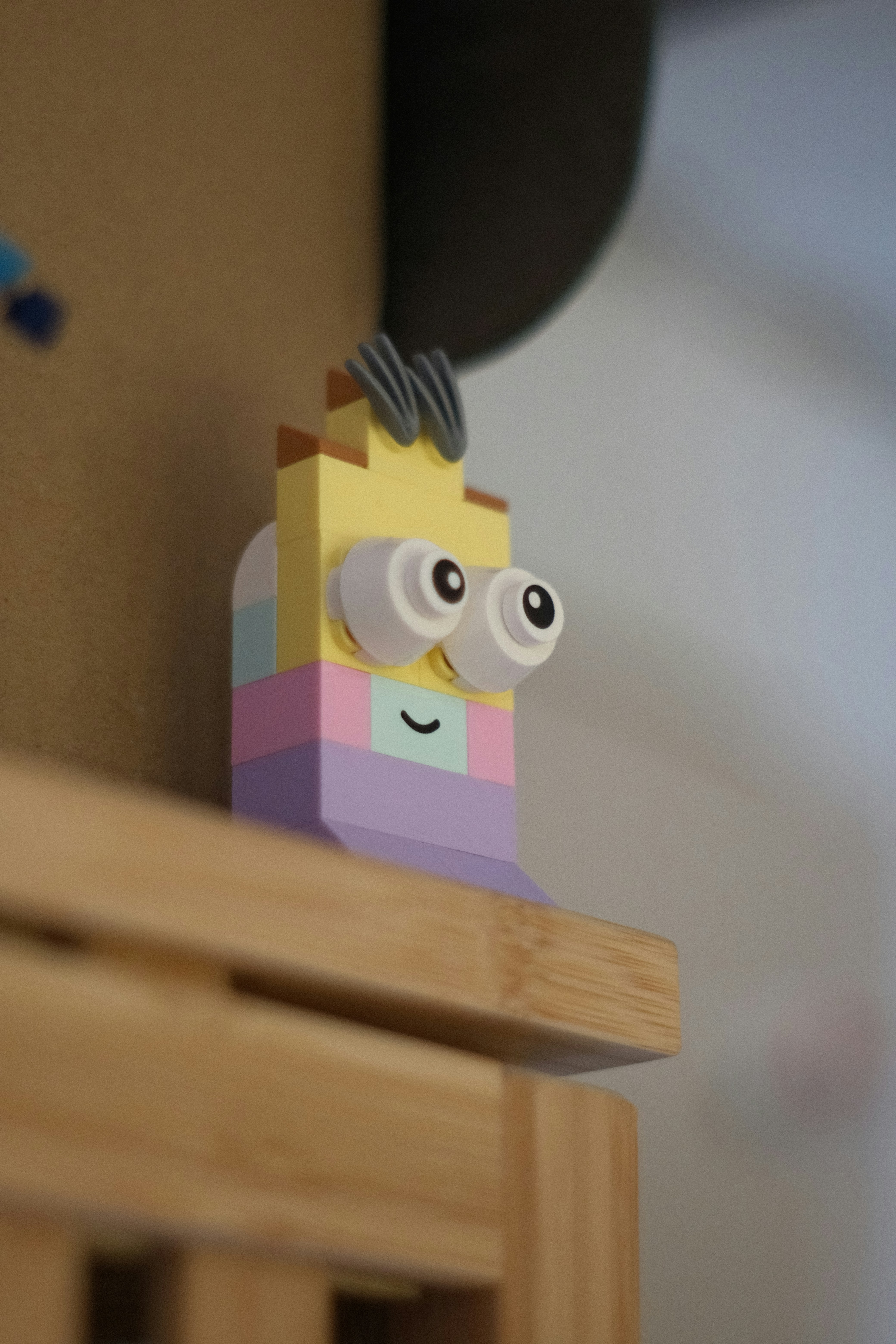 Whimsical Blocky Mascot Guarding the Wooden Shelf