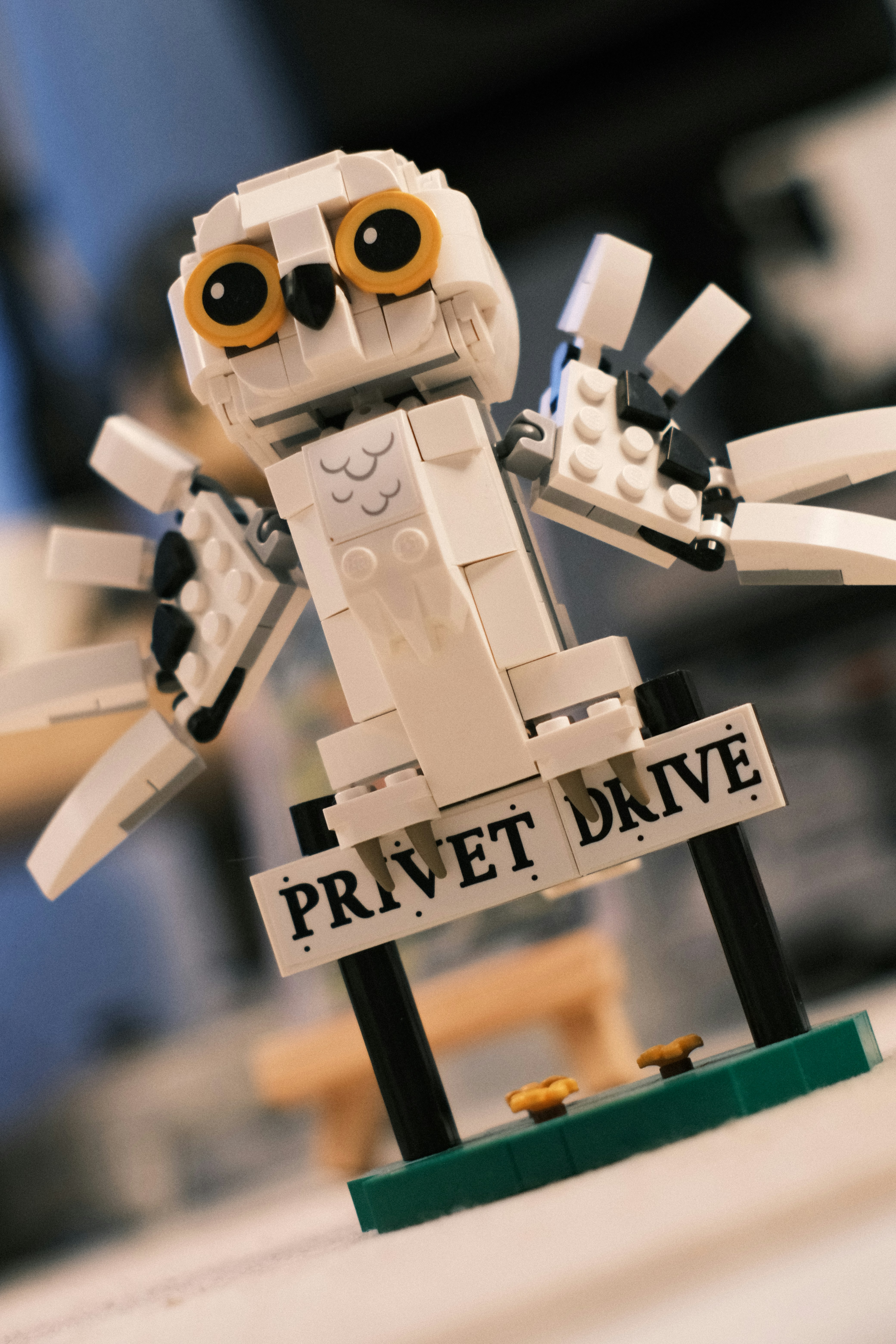 Lego Night Owl on a Whimsical Signpost