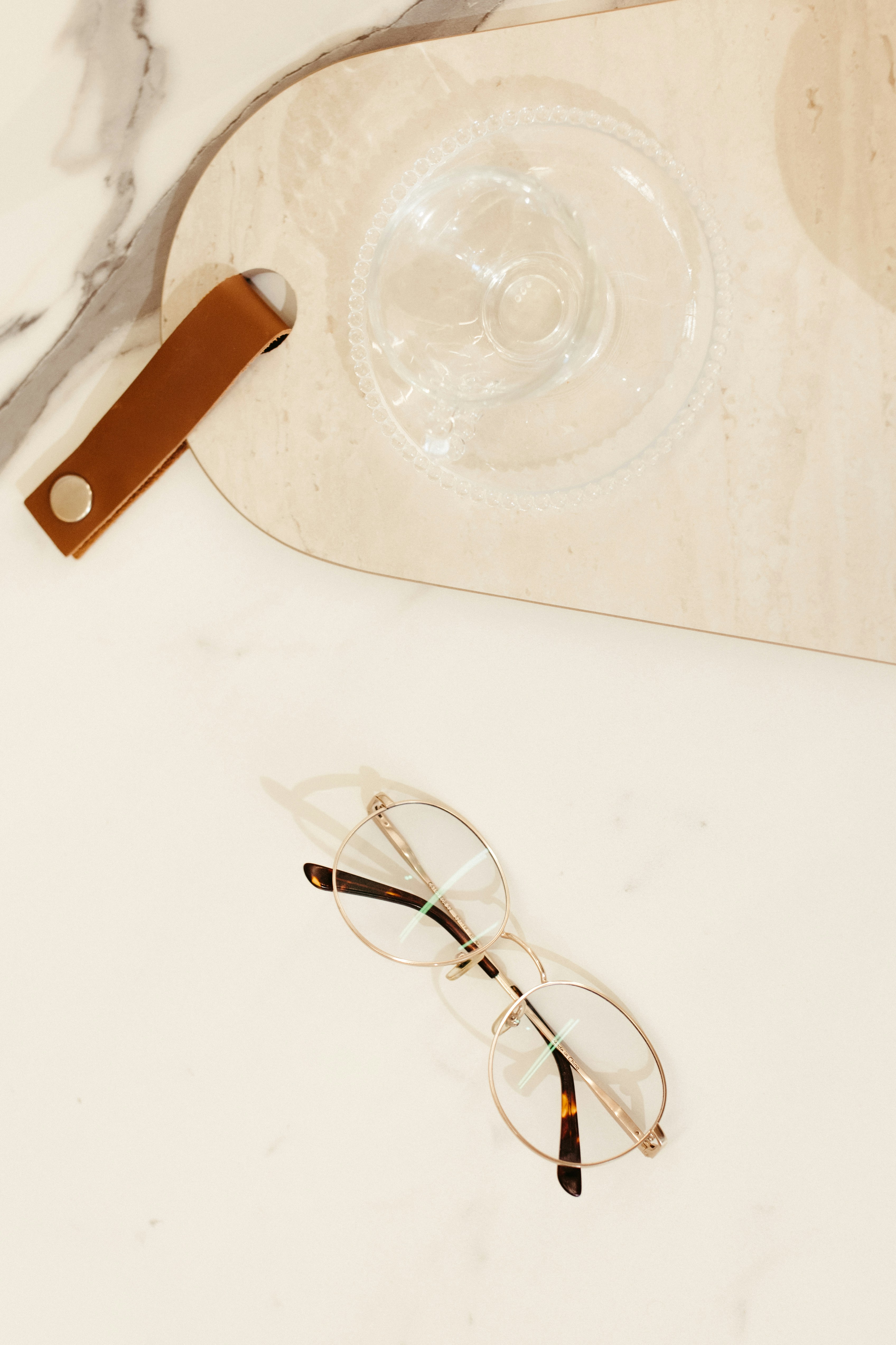 Glasses on Marble Surface Under Soft Lighting