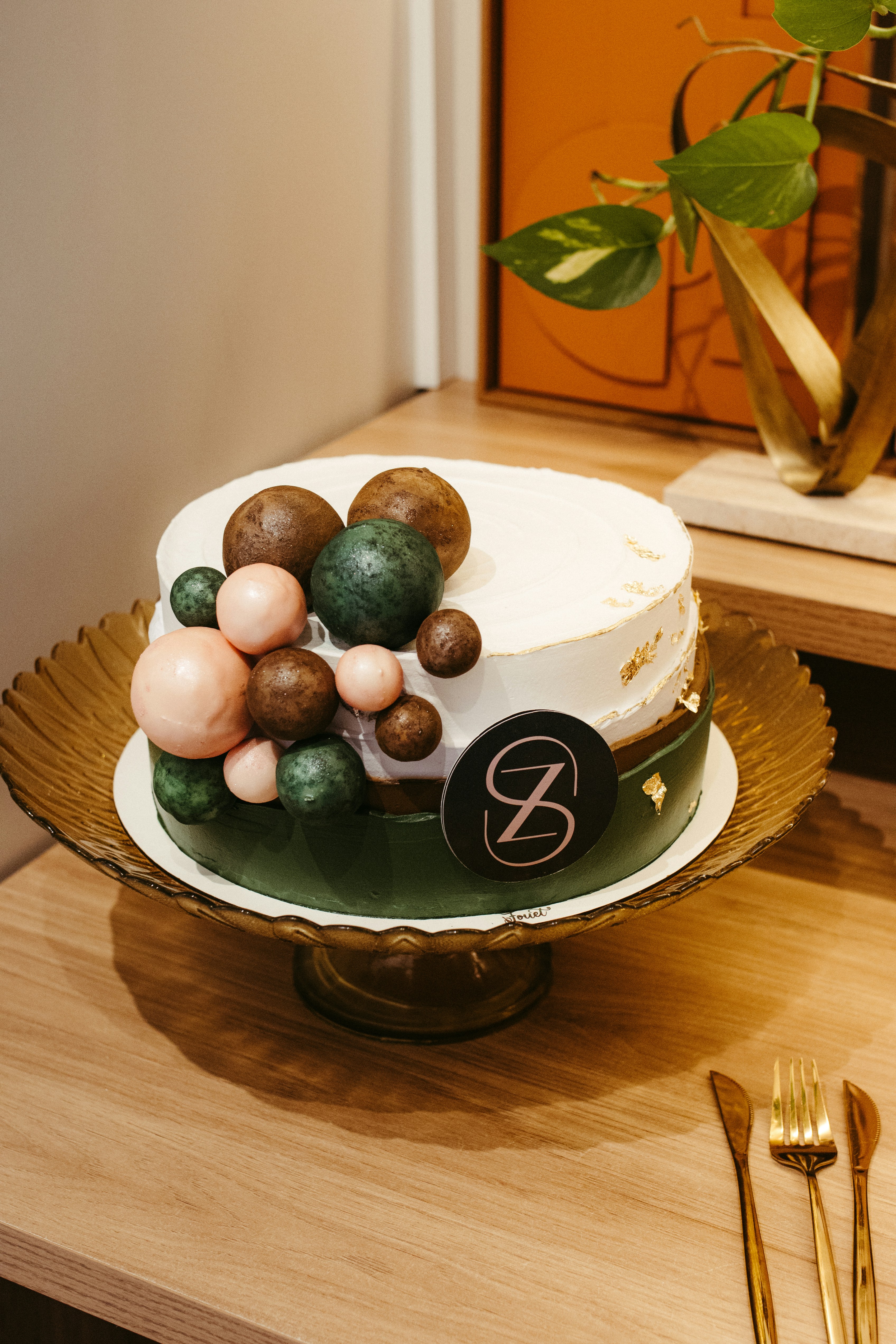 Sugar Bloom: A Festive Cake Adorned with Round Orbs