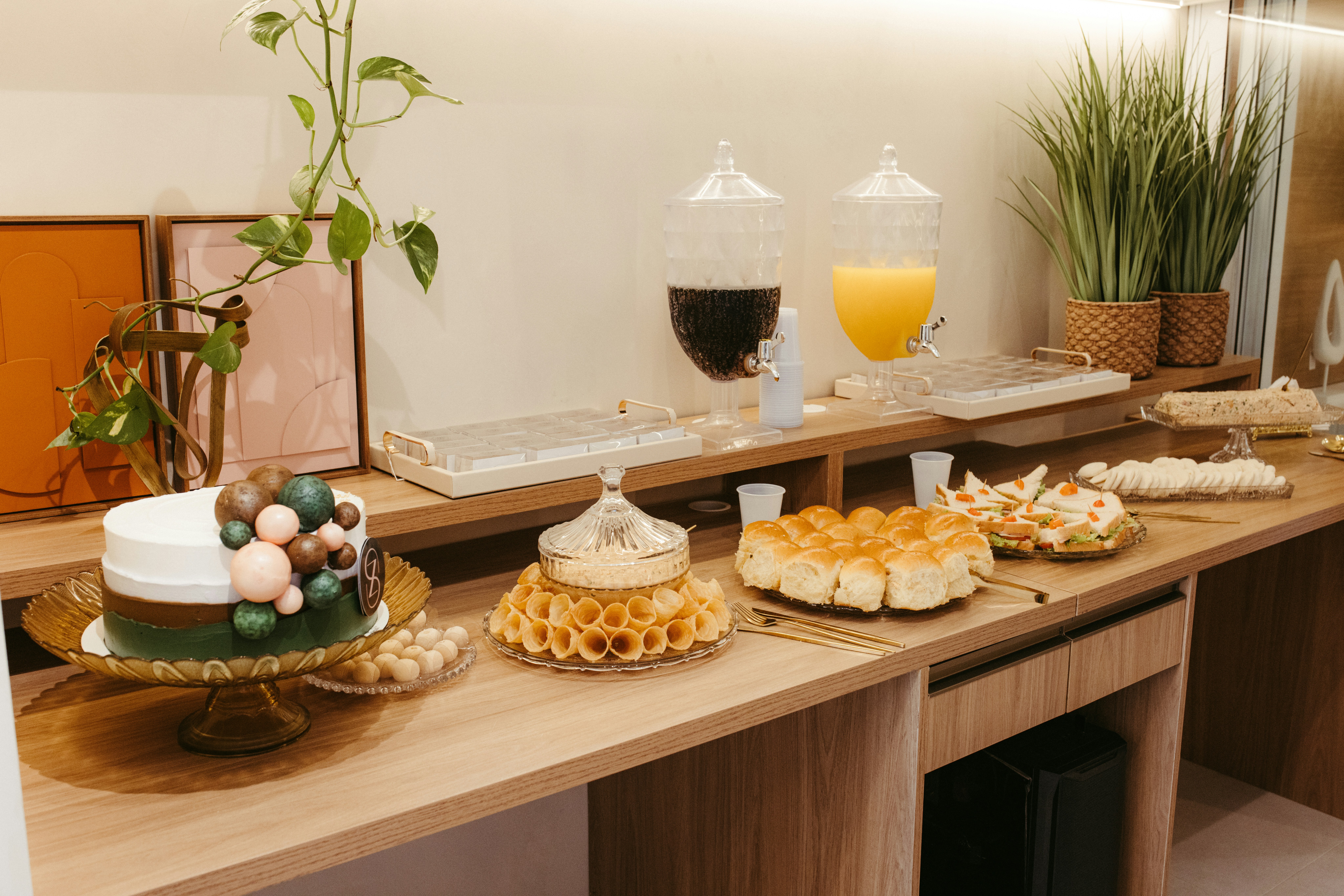 A Dessert Display: Creams, Pastries, and Drinks in Soft Evening Light