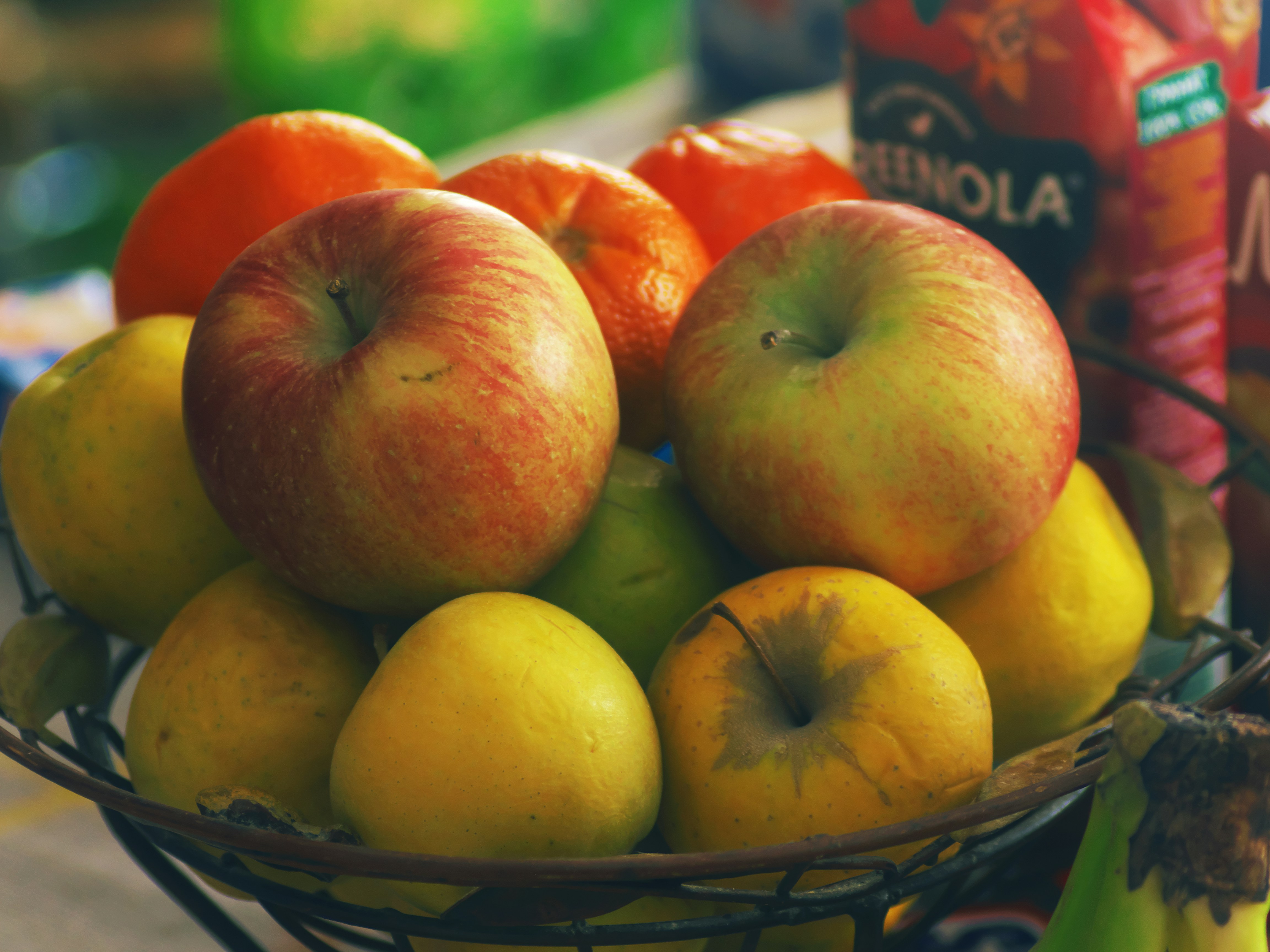 Crimson Spotlight on a Basket of Harvest Apples