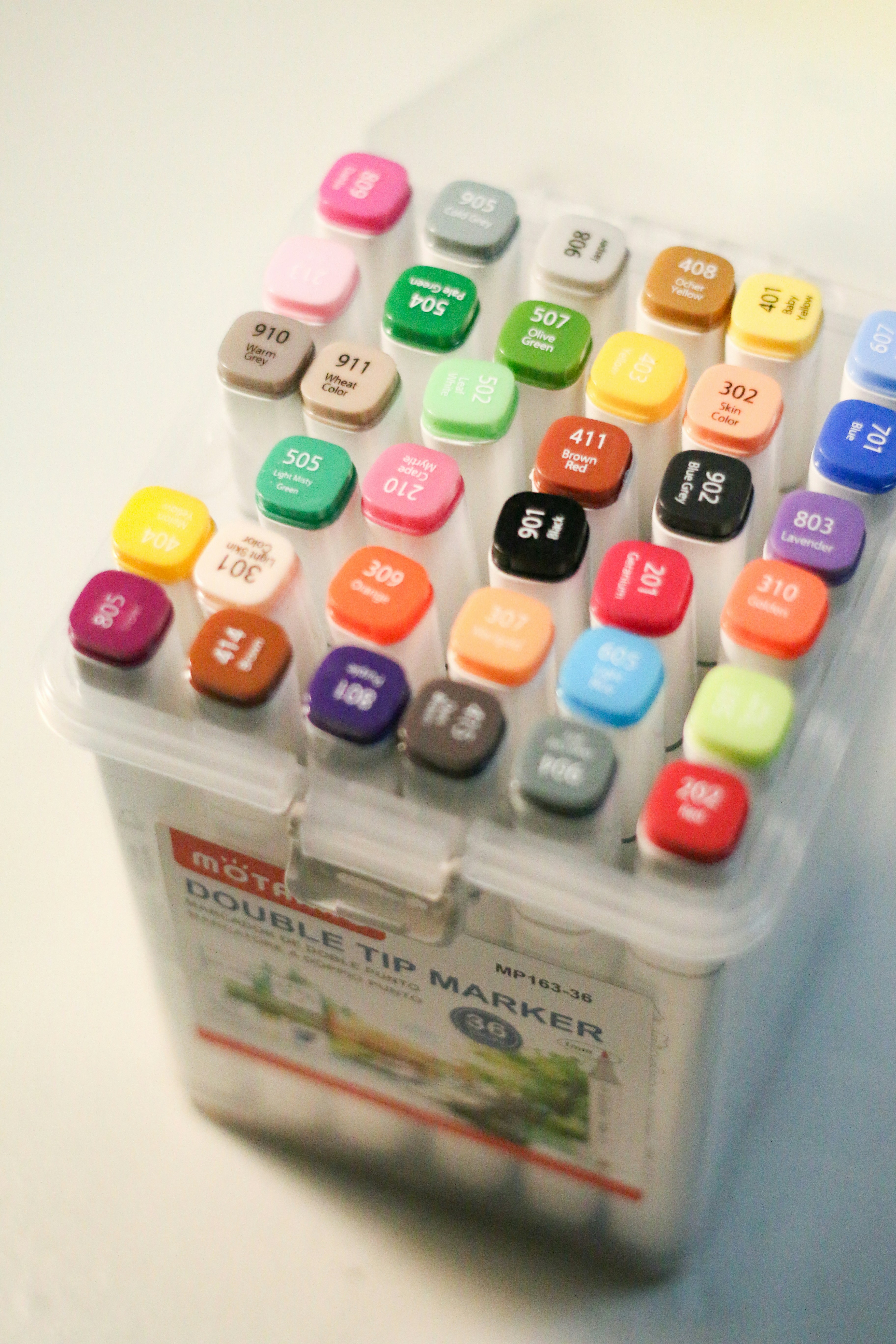 Colorful Marker Caps: A Close-Up of Inkful Precision
