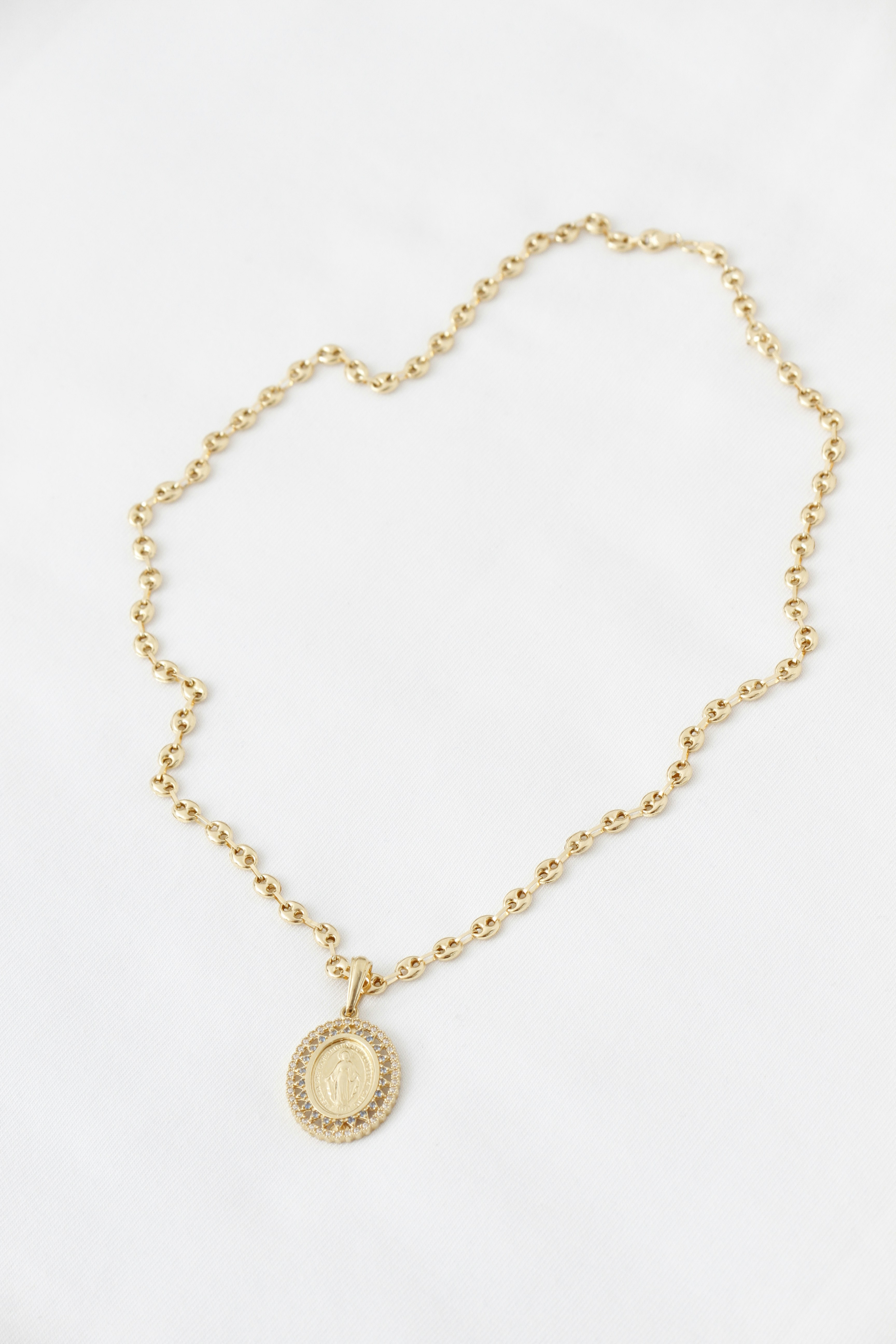 Golden Locket Necklace: Delicate Chain with Circular Medallion