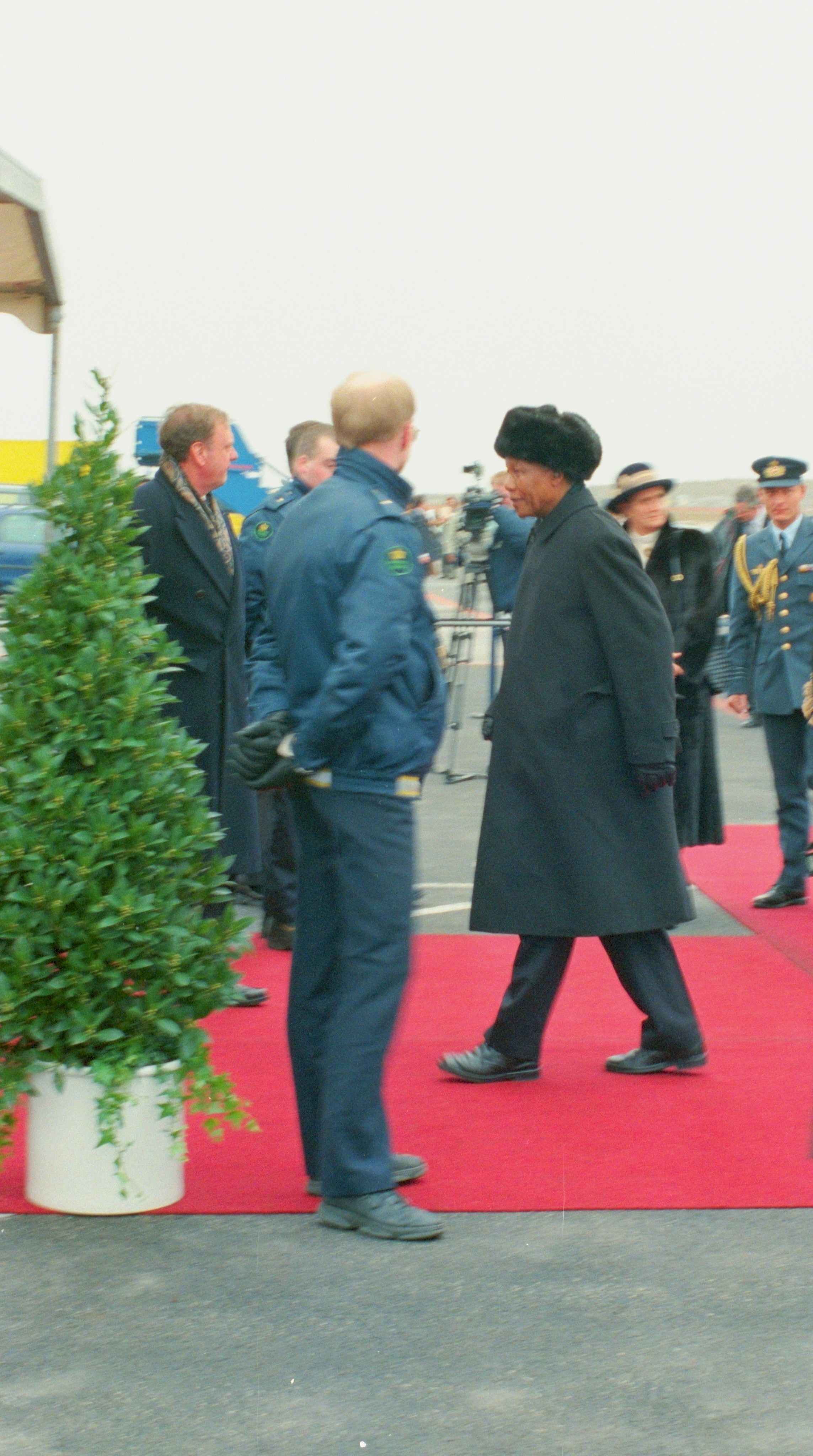 Diplomatic Arrival on a Red Carpet: A Moment Outside the Event Tent