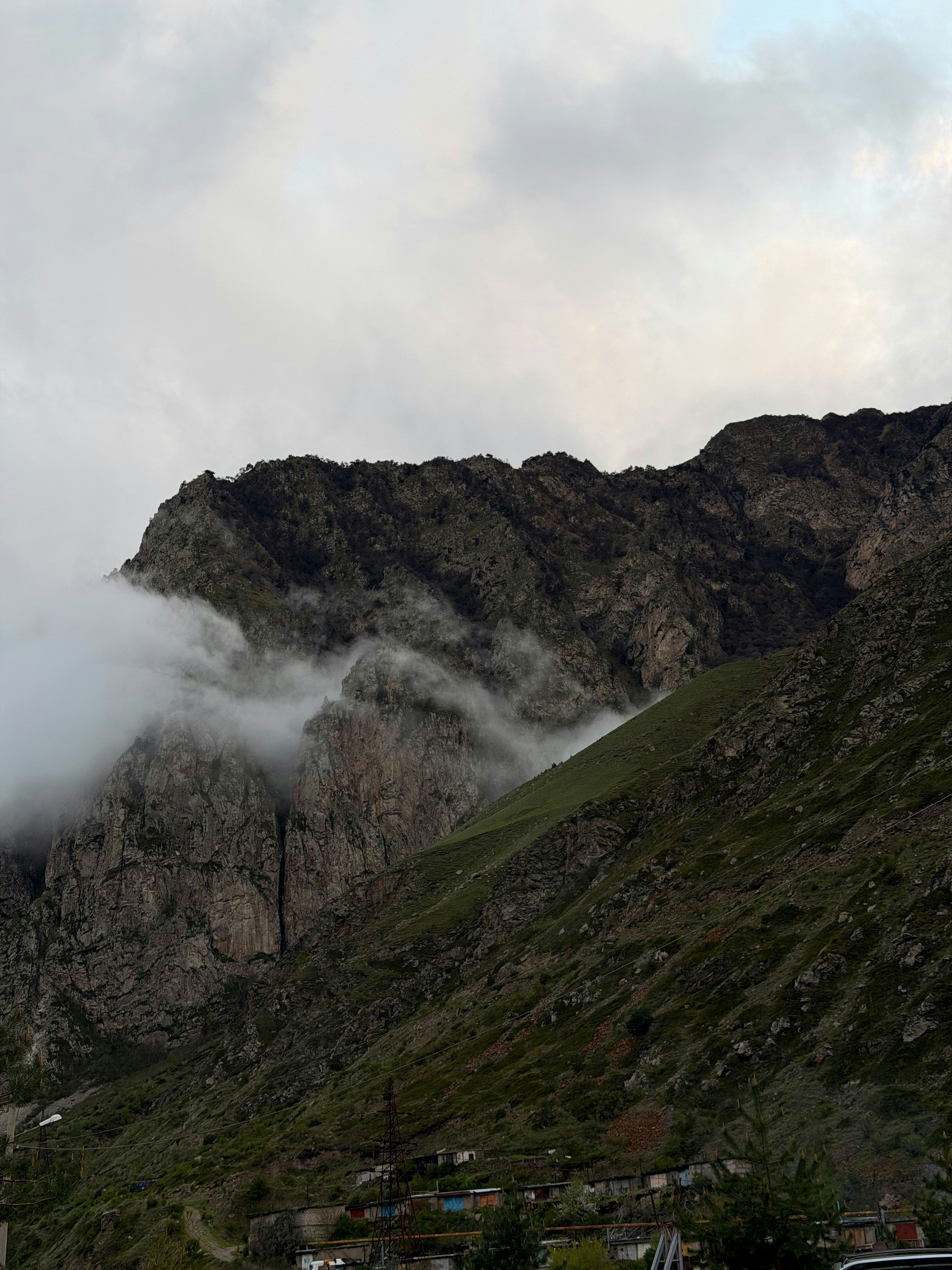 Misty Ridge Overlook: A Quiet Alpine Crest Emerging from Clouds