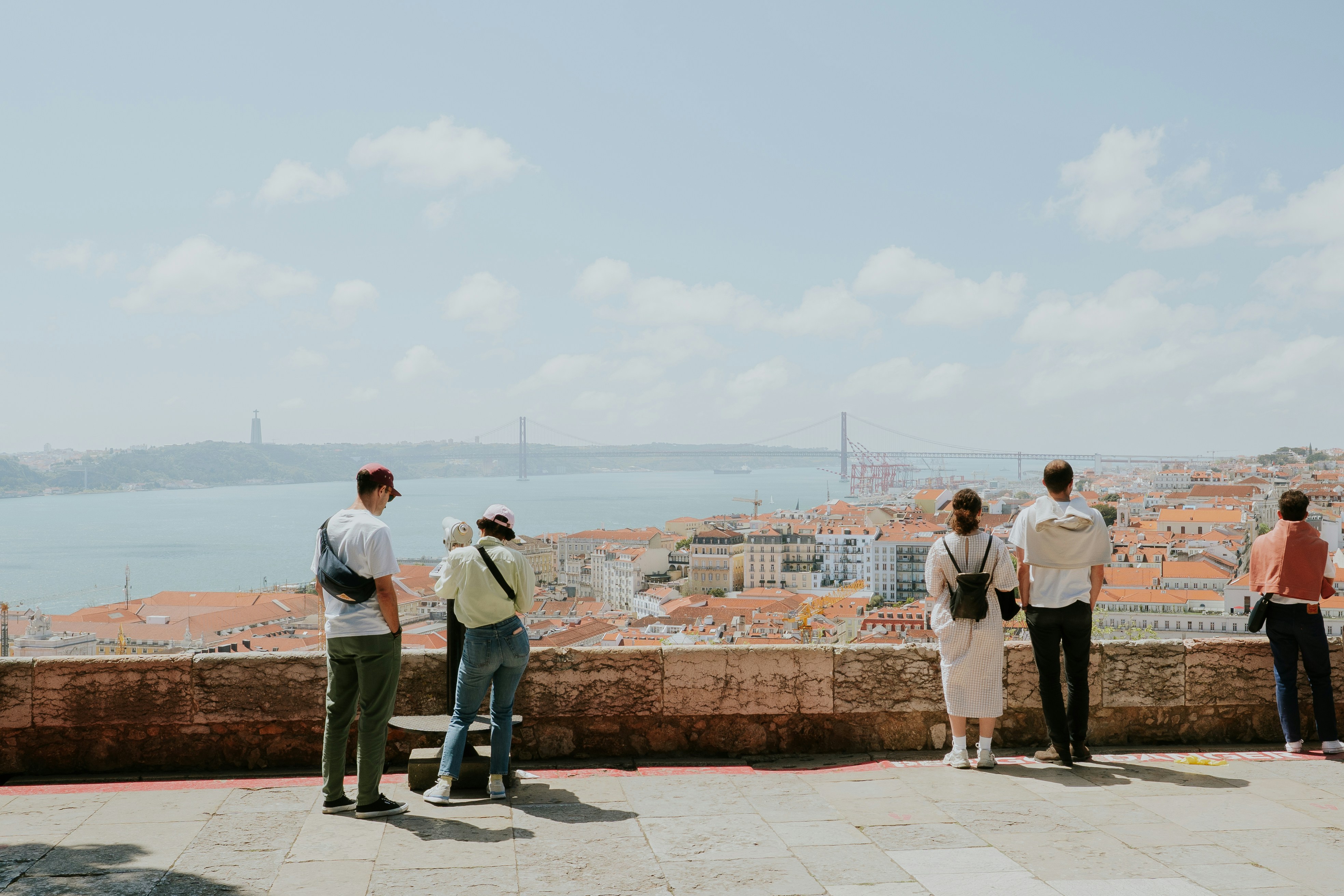 Overlook Among the Rooftops: A Horizon of Quiet Observers