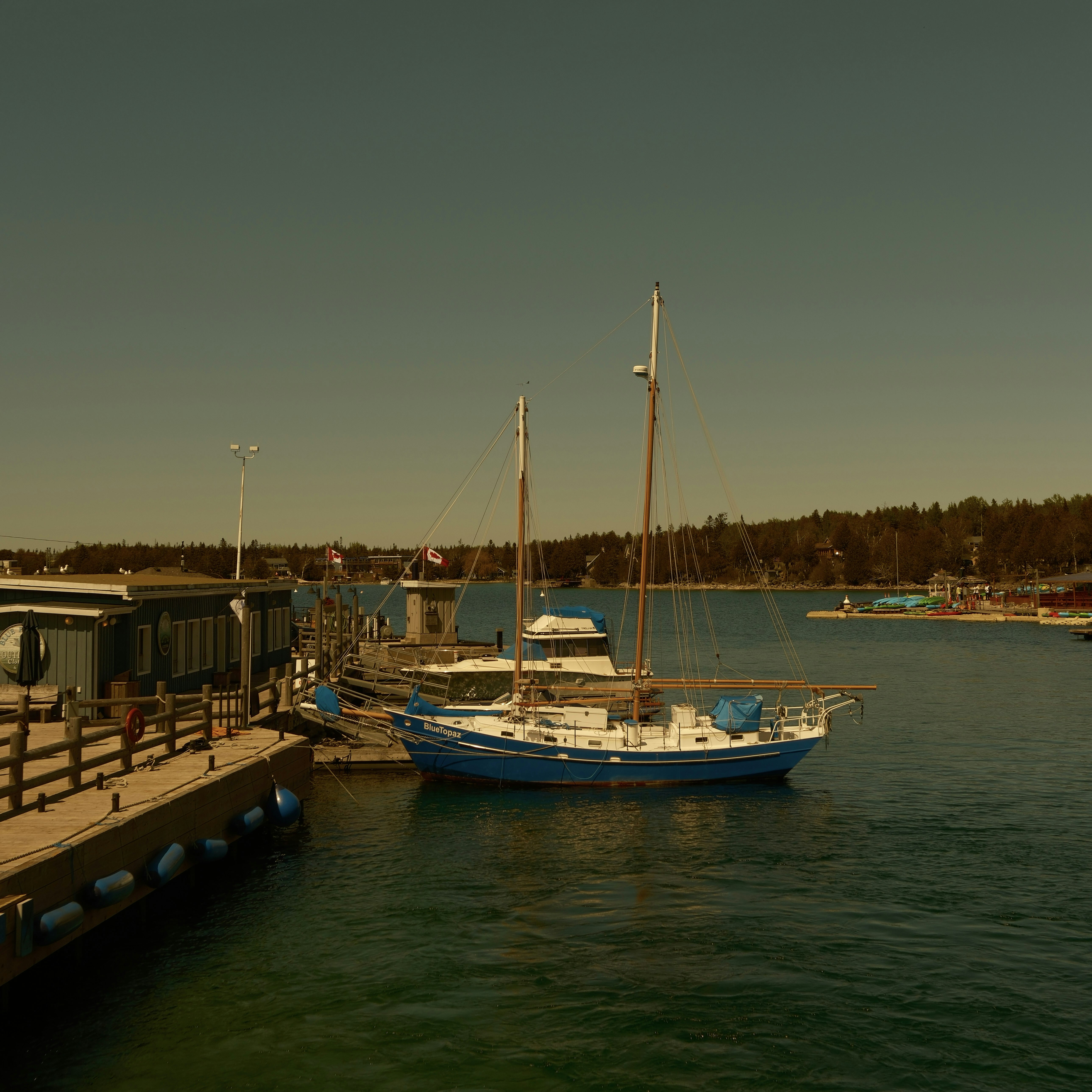 Sailboat at Dusk: A Quiet Marina Scene