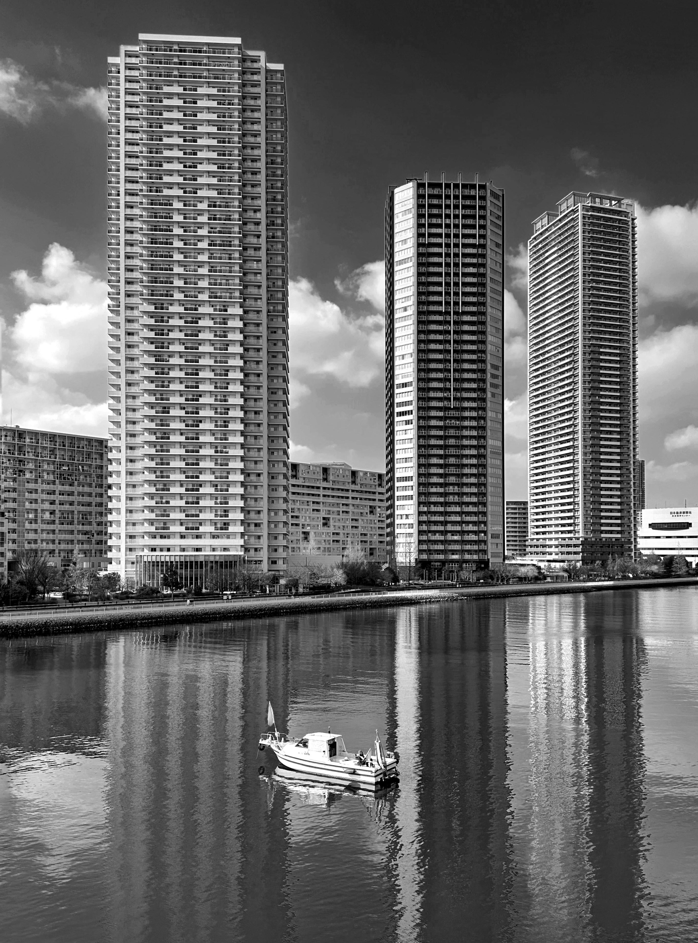 Reflections Over the River: Skyscrapers Standing Tall