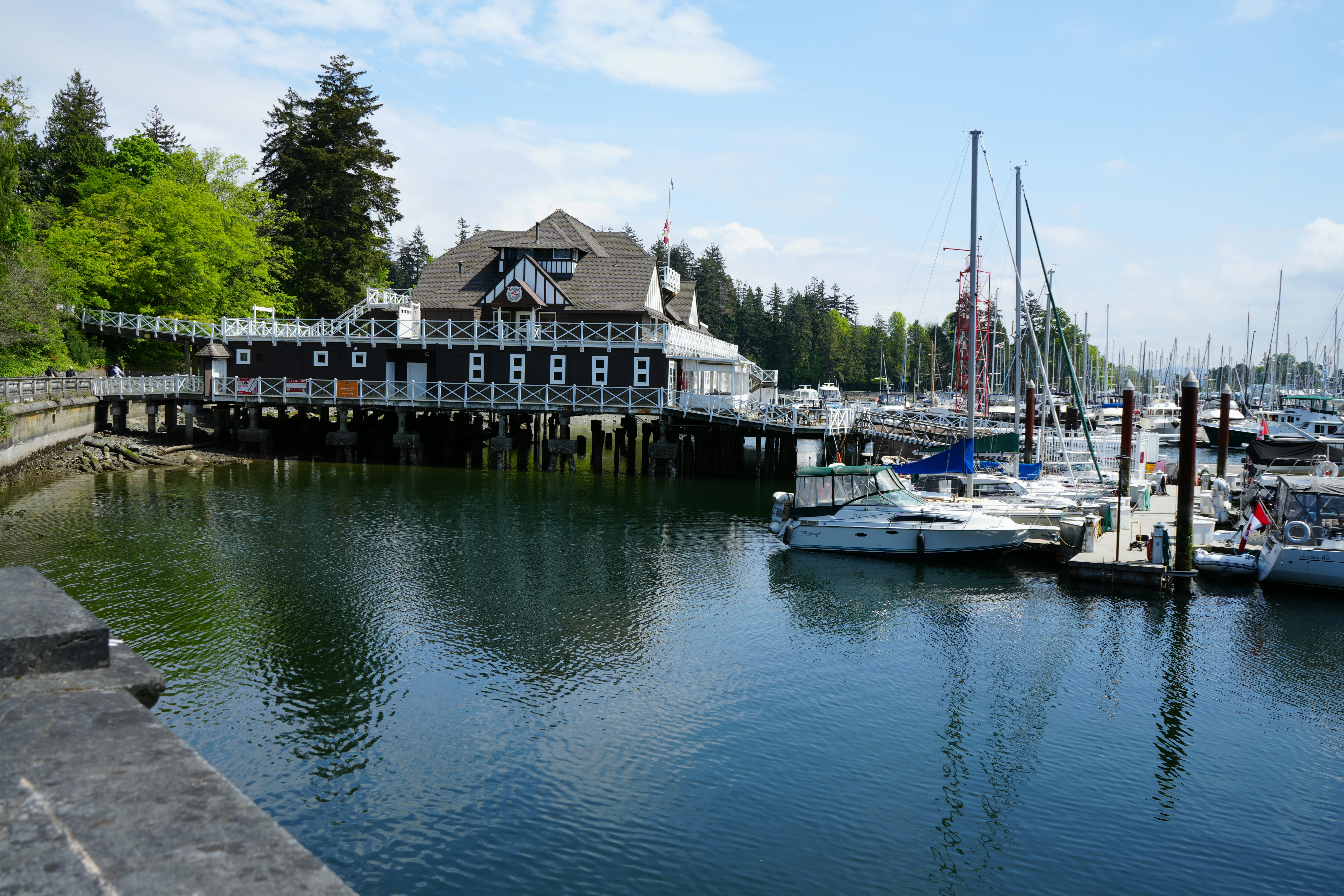 Harbor Café by the Docks: A Timbered Pavilion Over Calm Water