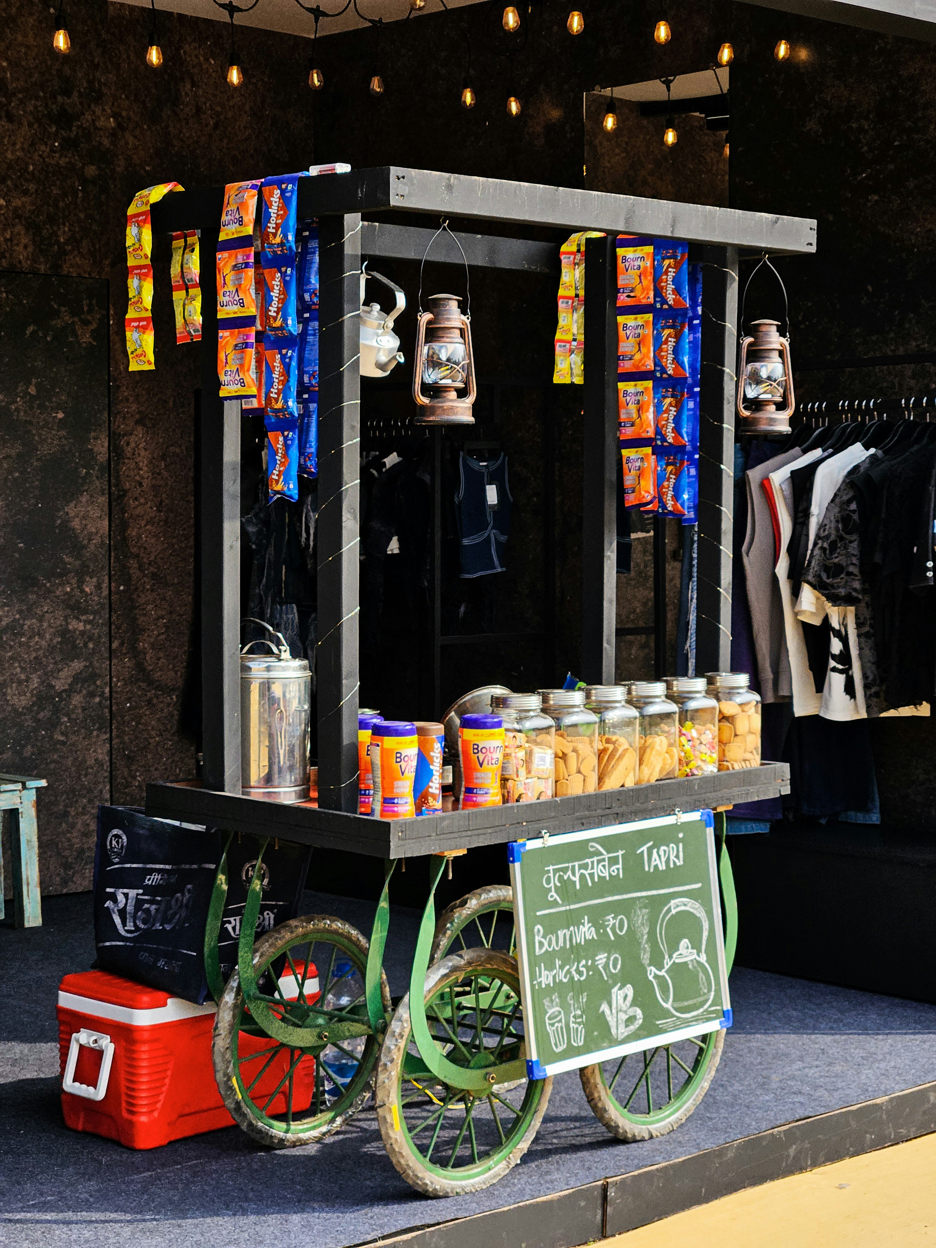 Snack Stand on a Vintage Cart: A Quiet Bazaar of Jars and Jackets