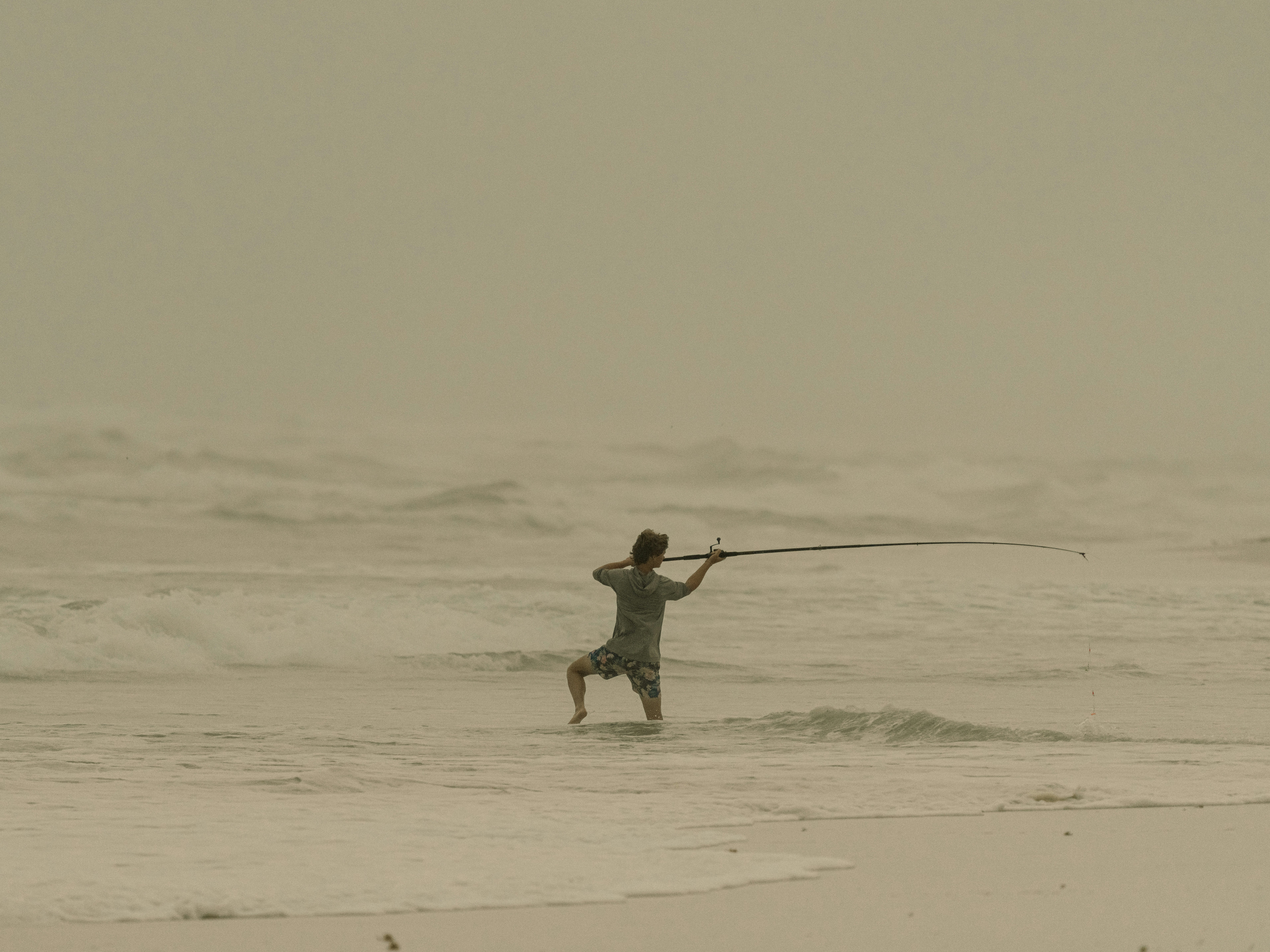 Rider in the Salted Sea: A Solemn Launch Across Wet Horizon