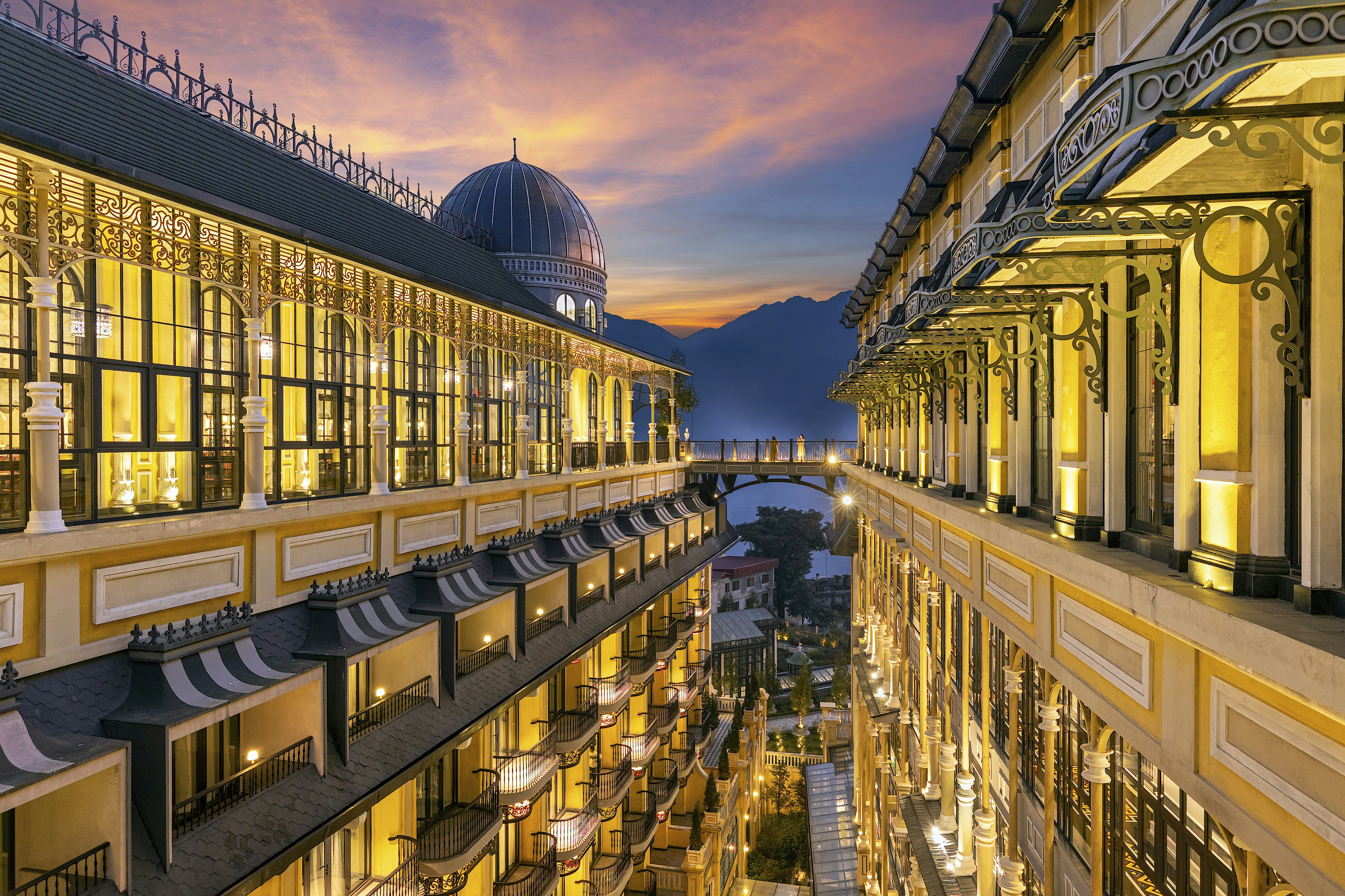Golden Arches: Sunset Glow Over a Palace Courtyard