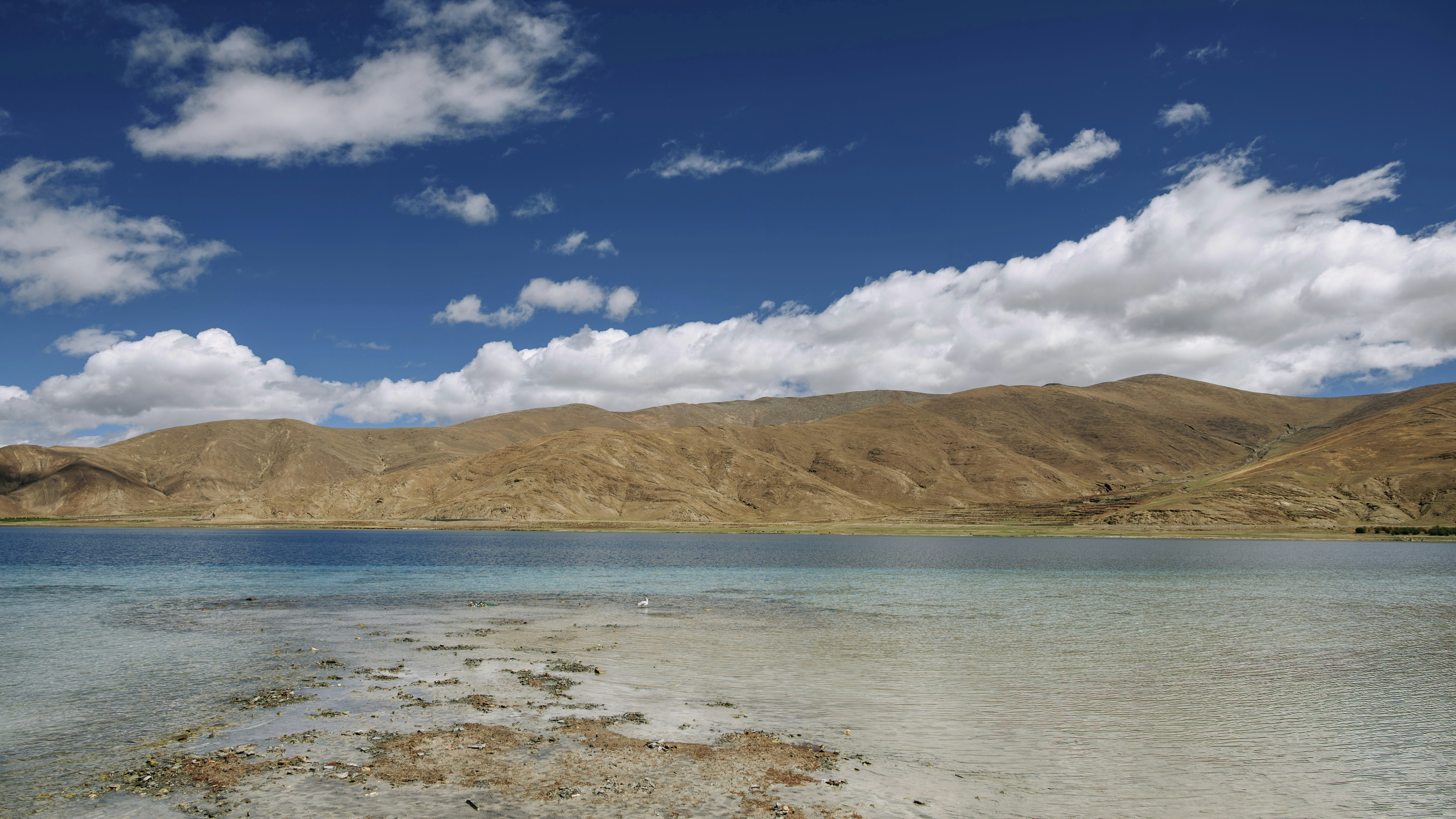 Desert Ridge Over a Glassy Salt Lake