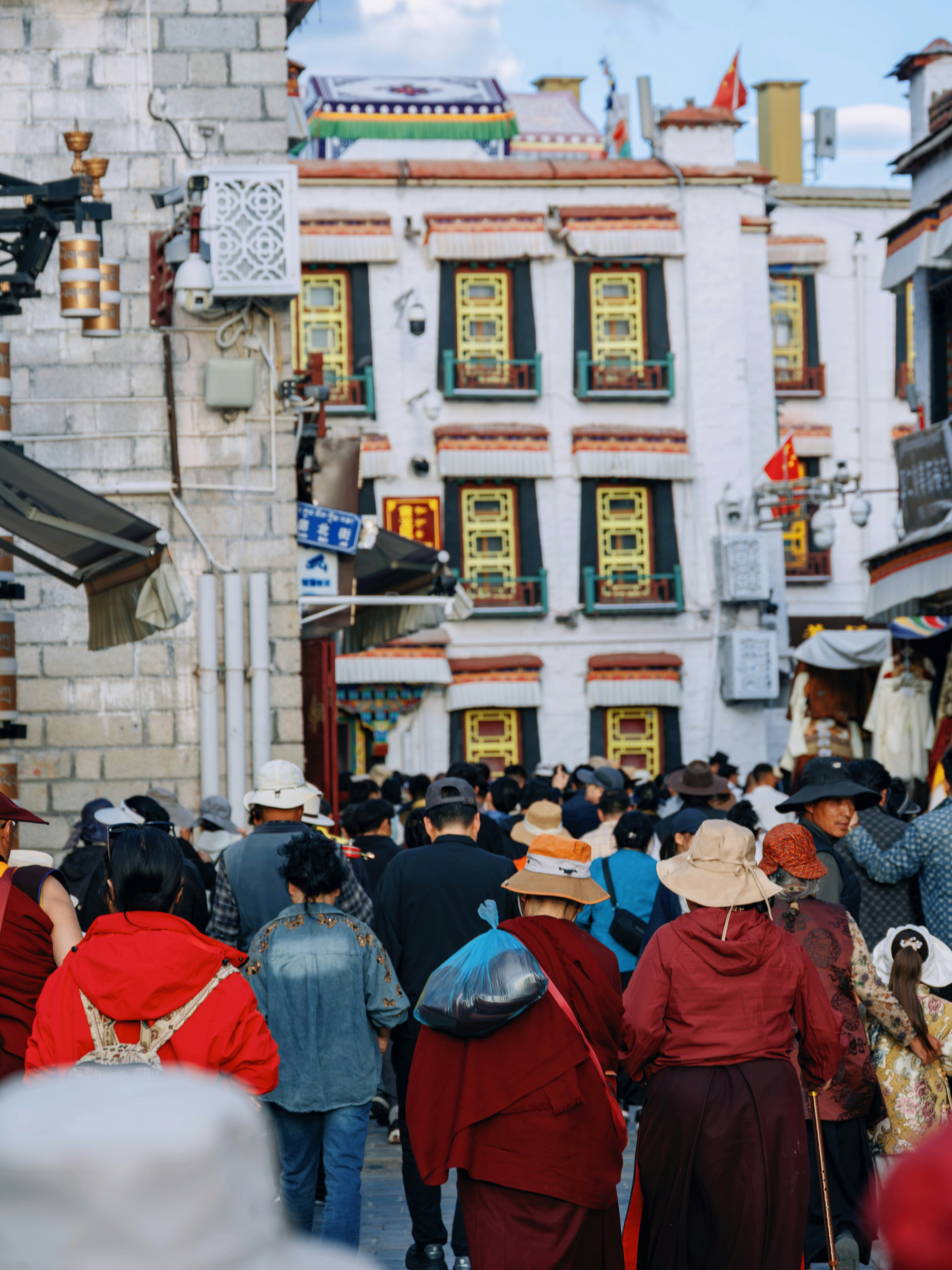 Crowded Courtyard Corridor Toward a Tibetan-Style Facade