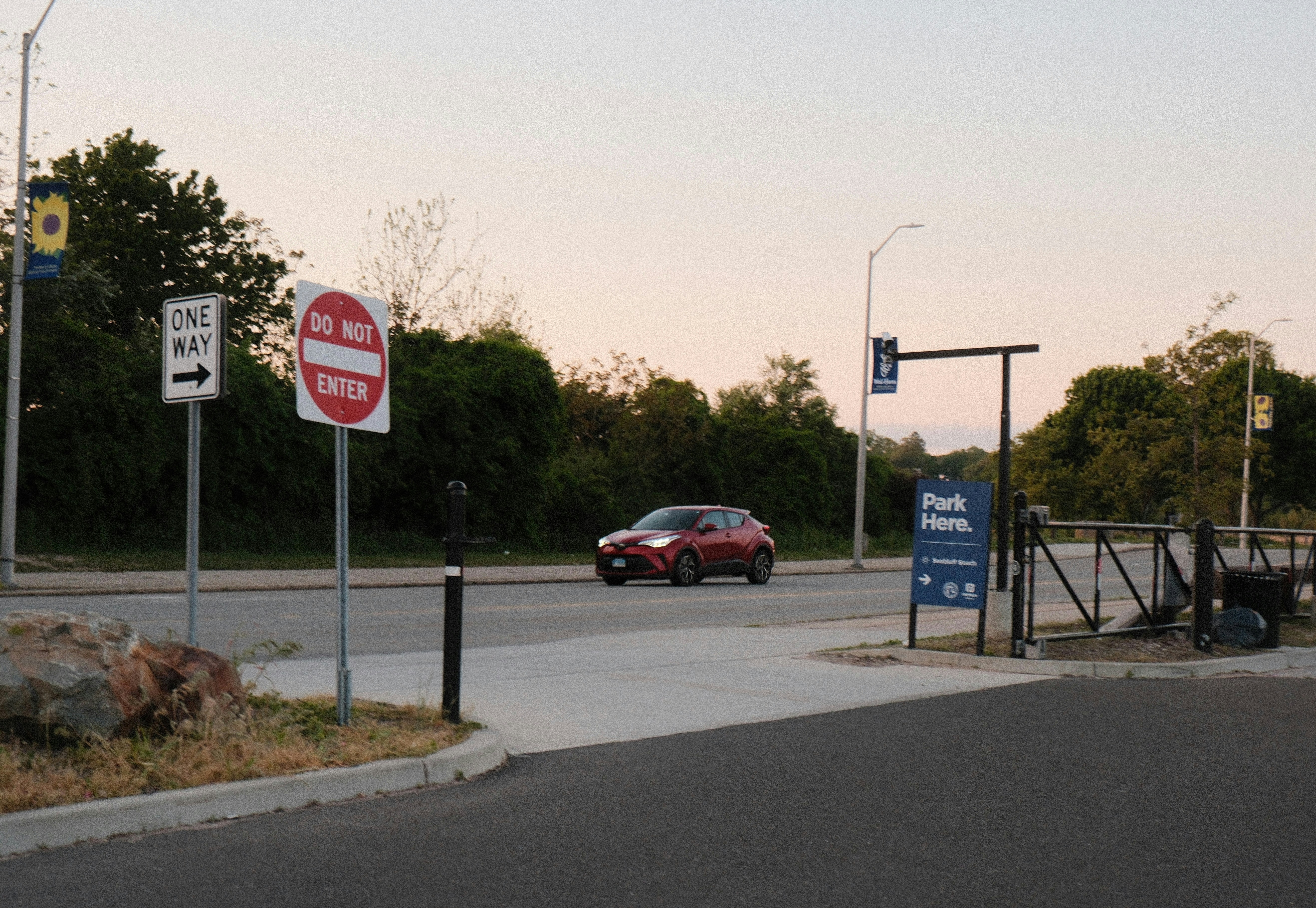 Red Car at the Park Gate