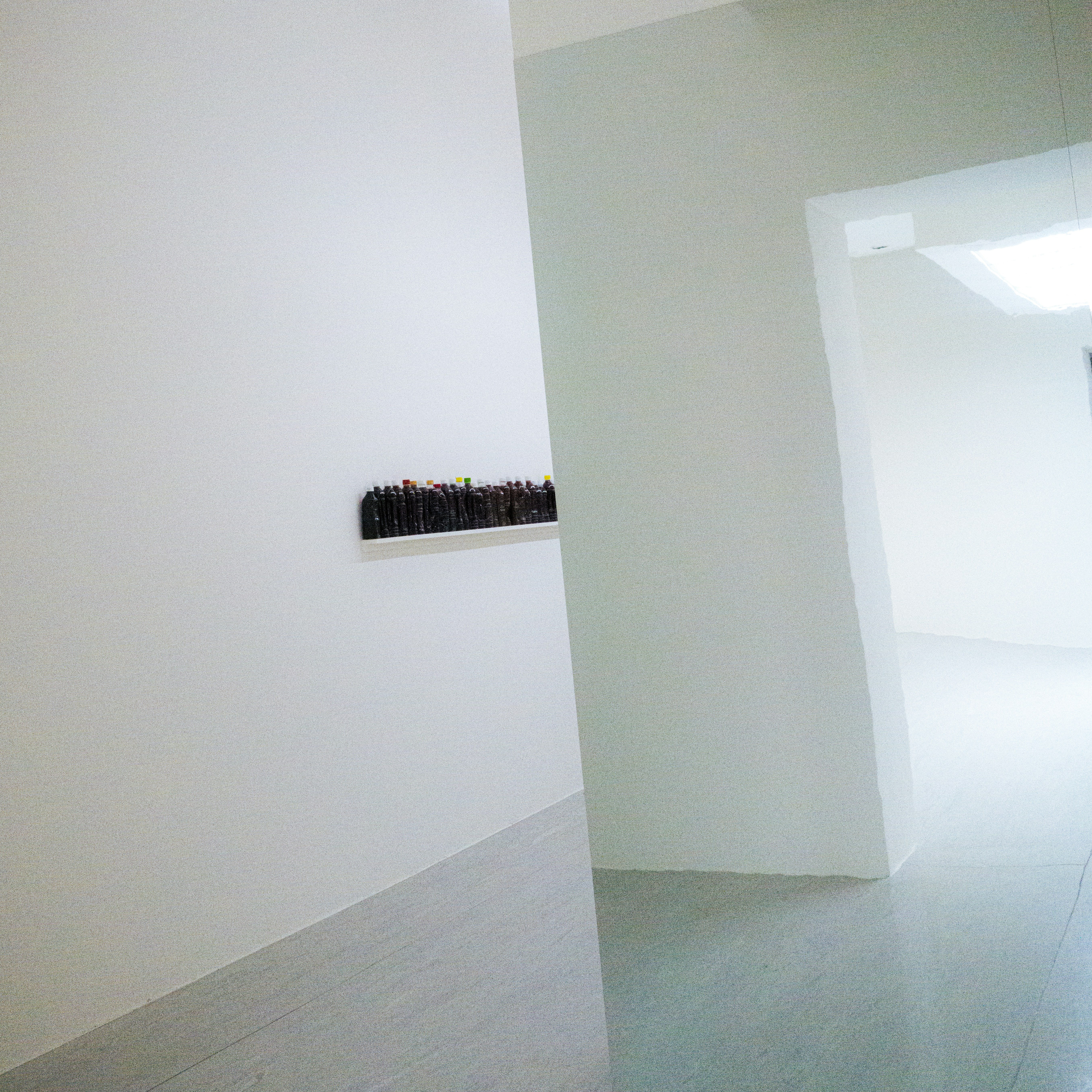 Minimal Gallery Corridor with a Floating Shelf