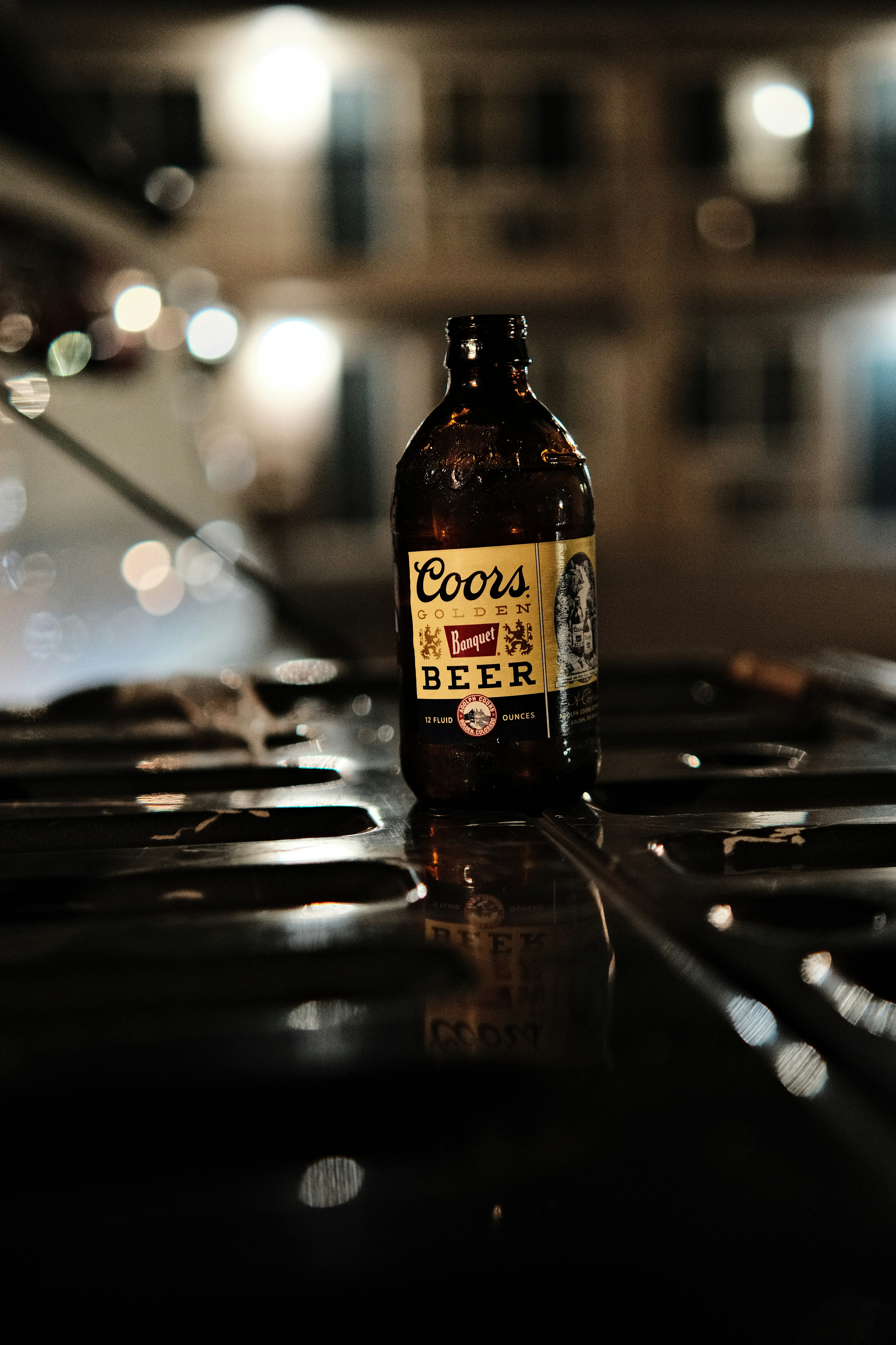 Midnight Coors: A Quiet Beer on Steel and Glass