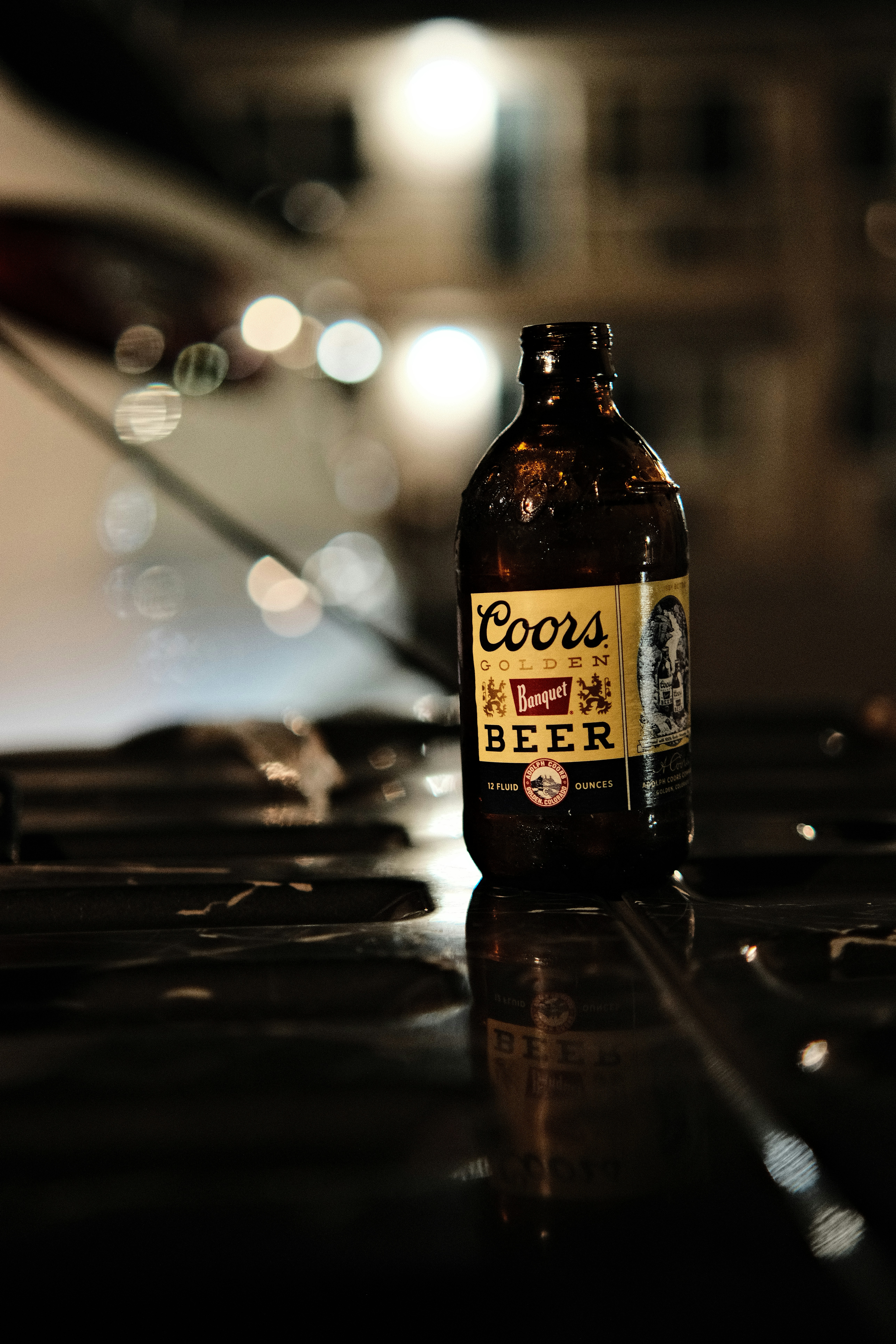 Amber Glass, Neon Glow: A Bottled Moment on the Grill
