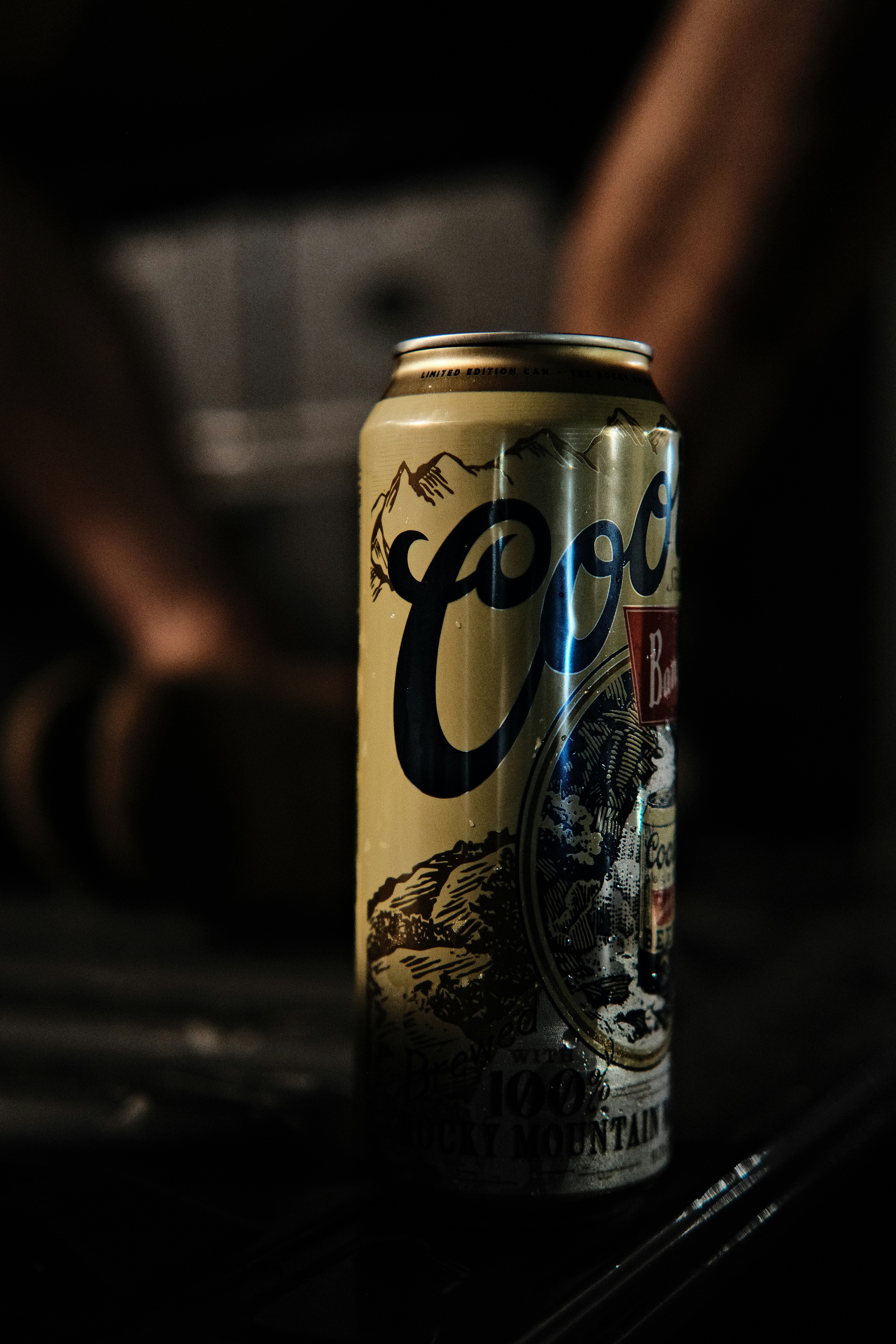 Canned Summit: A Lone Colorado Crest on a Dark Studio Table