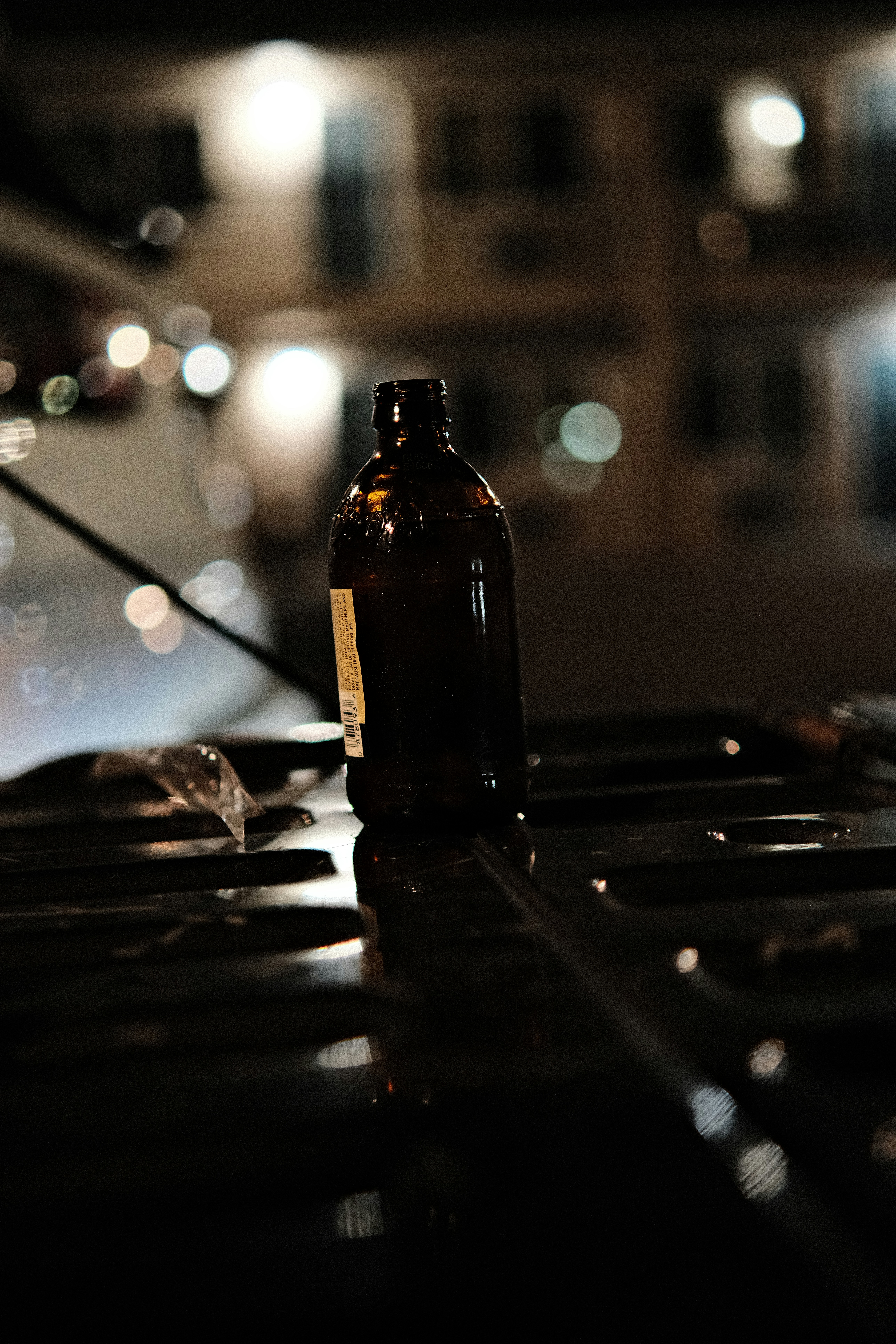 Midnight Draft: A Lone Bottle Under Streetlight