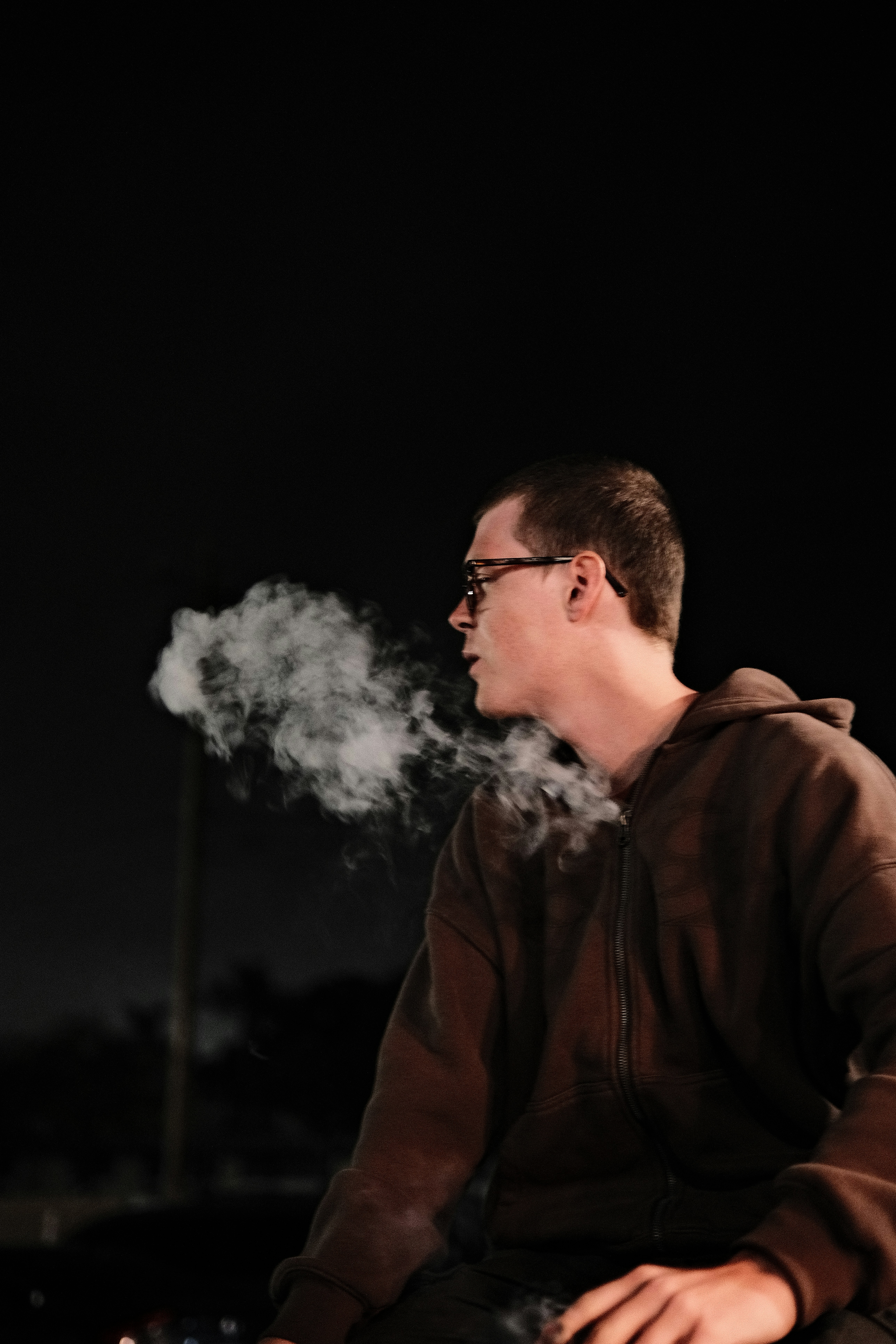 Night Vapor: A Quiet Moment in Amber Hoodie